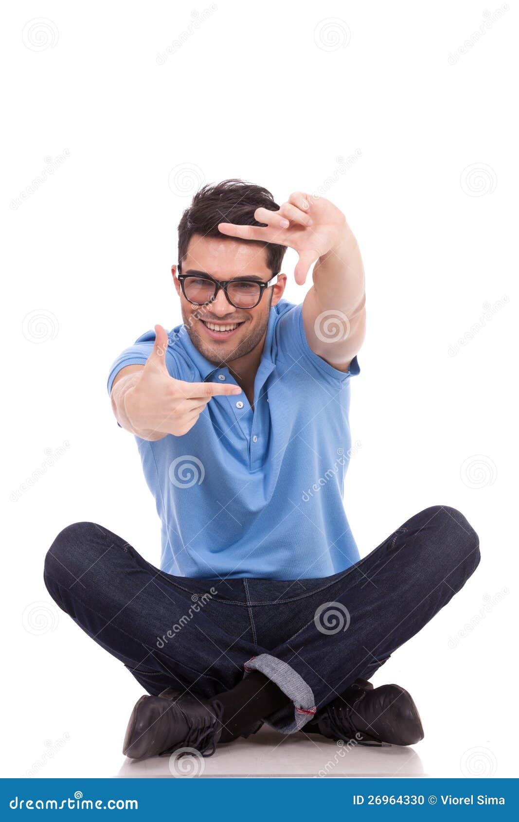 Young Man Sitting Making Frame Stock Photo - Image of crossed, cute ...