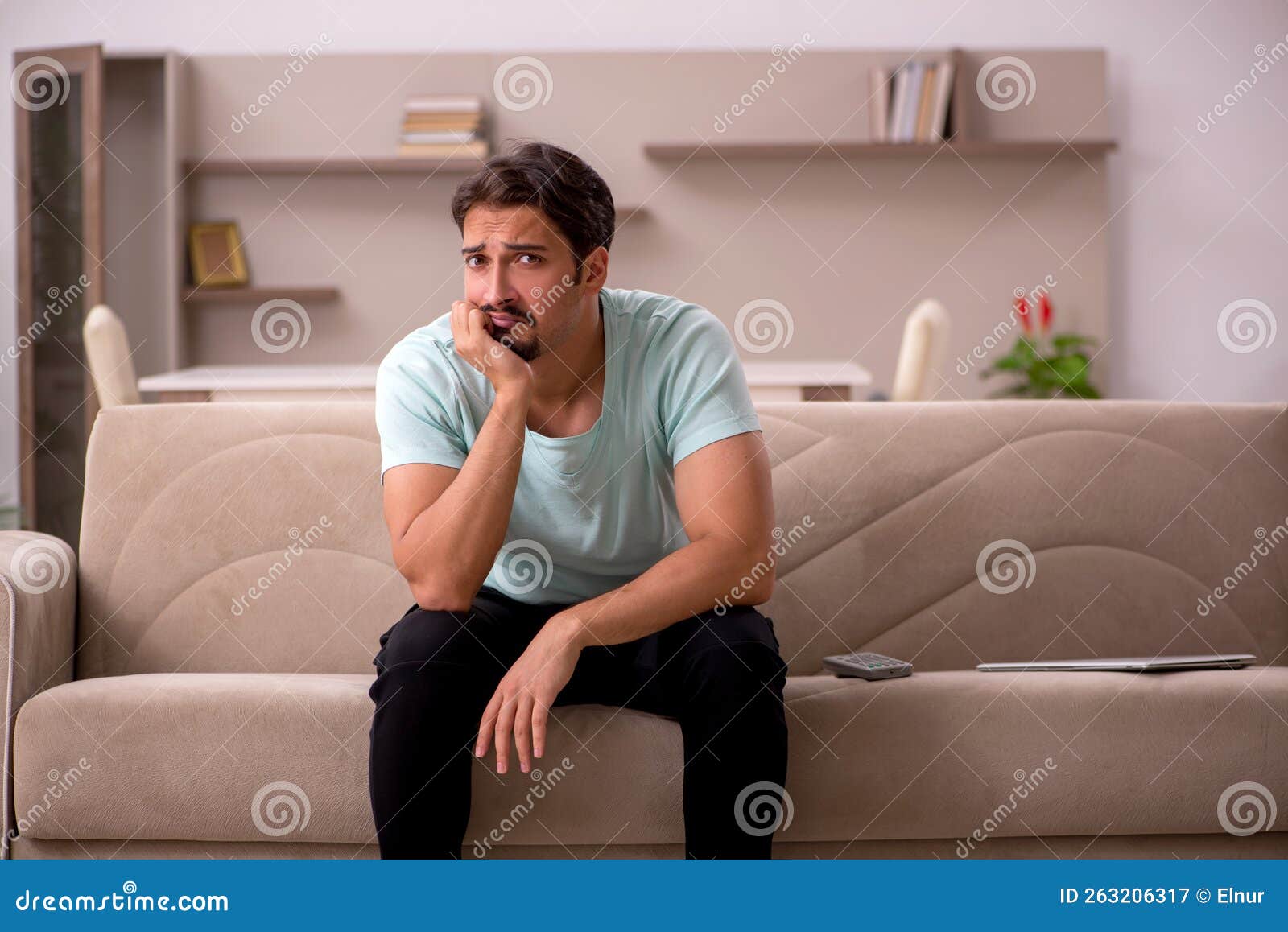 Young Man Sitting on the Sofa Stock Image - Image of coronavirus ...