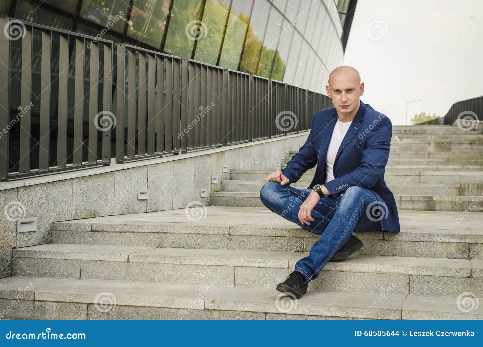 Young Man Sitting on Stairs Stock Photo - Image of black, confidence ...