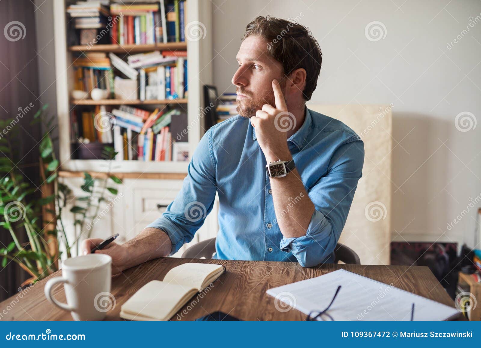 Young Man Deep in Thought while Working from Home Stock Photo - Image ...