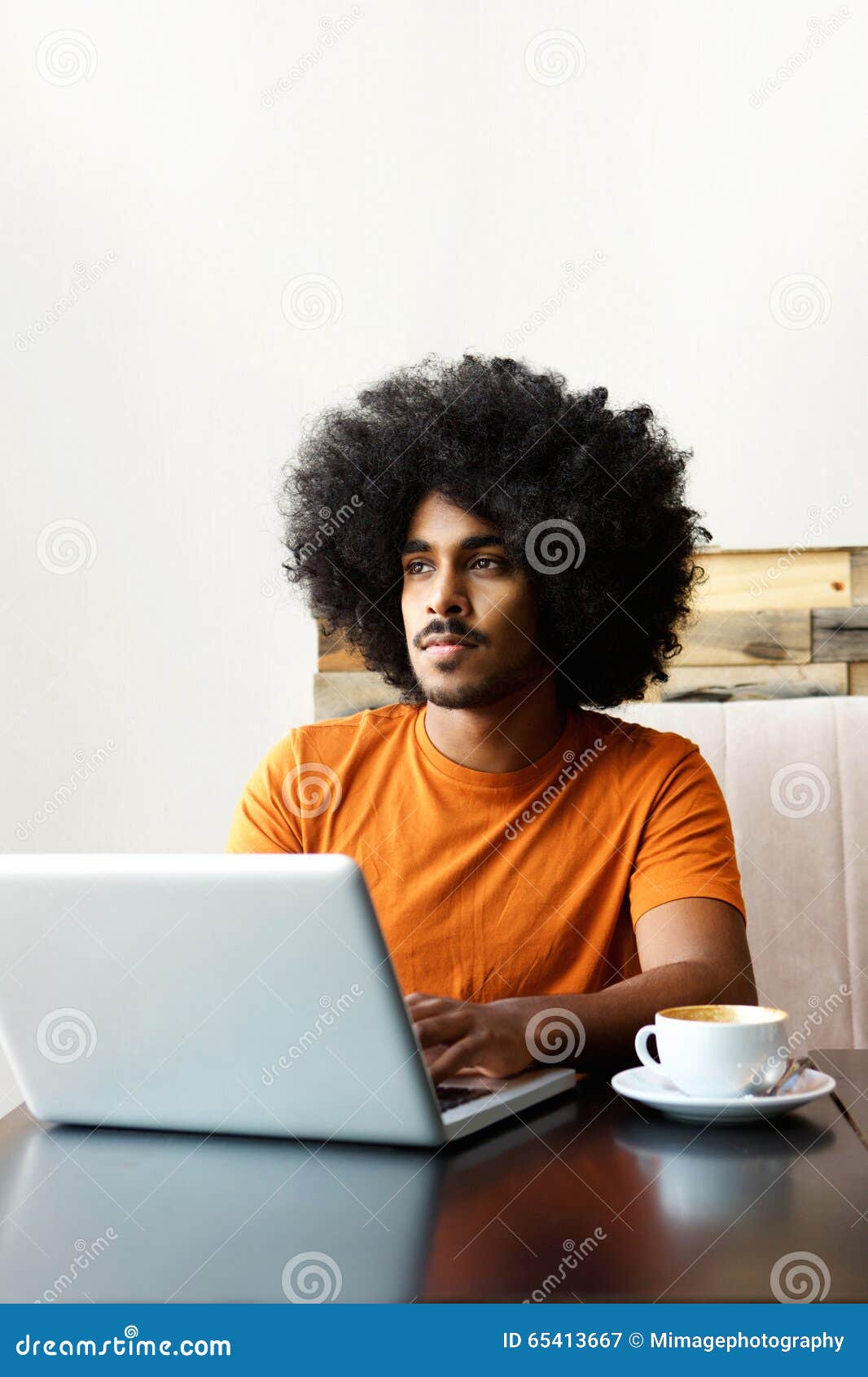 Young Man Sitting at Table with Laptop Stock Image - Image of cool ...