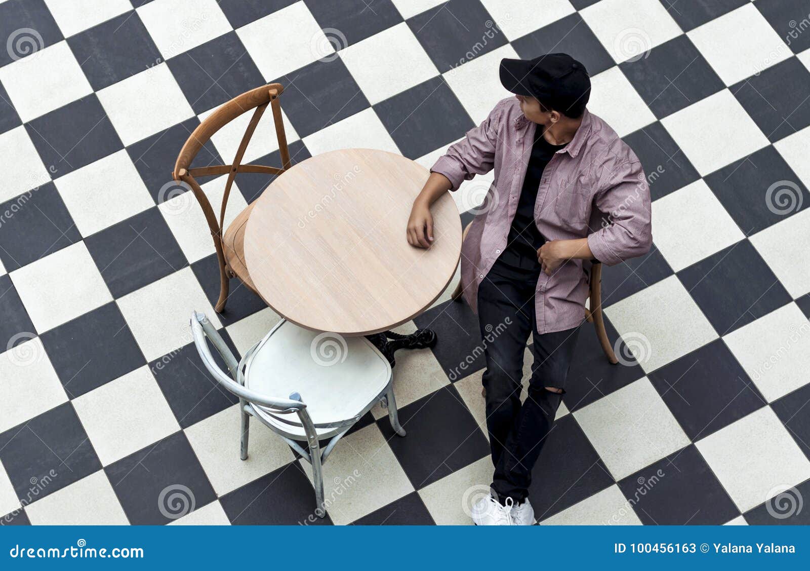 Young Man Sitting at Table, Top View Stock Image - Image of furniture ...