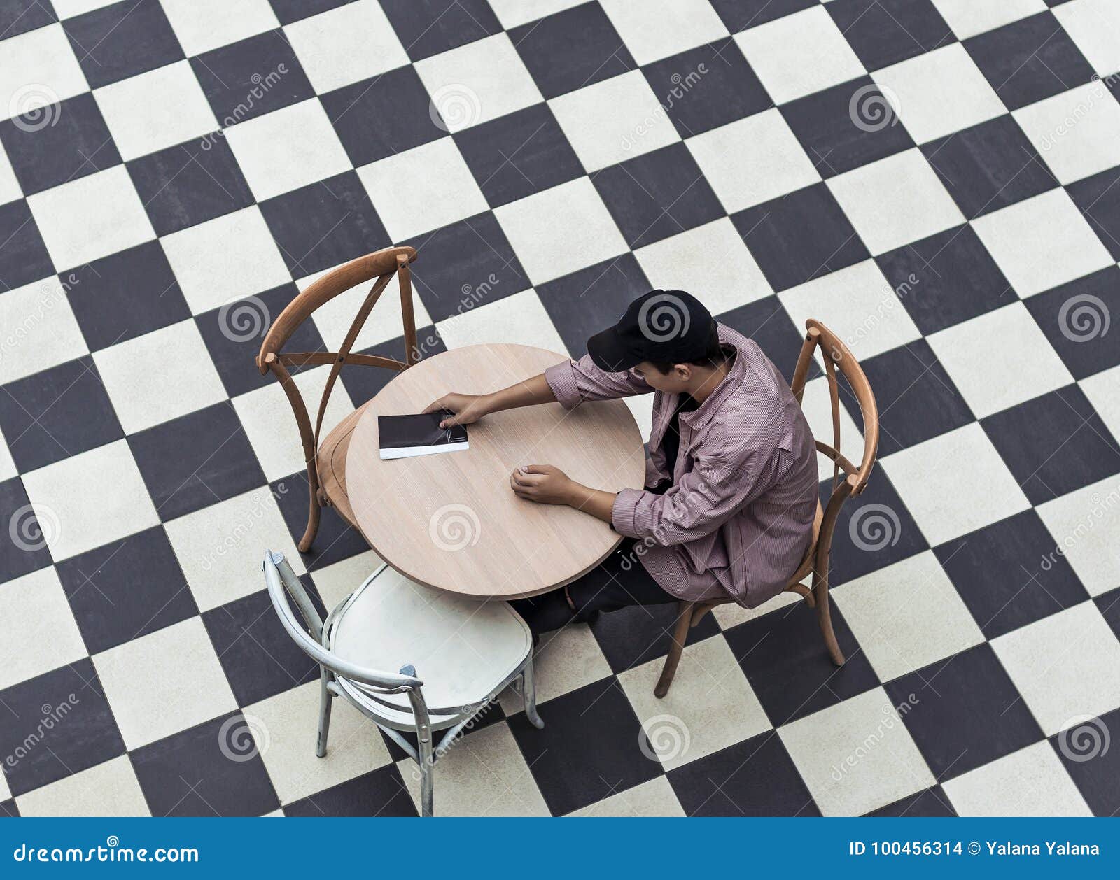 Young Man Sitting at Table, Top View Stock Photo - Image of pensive ...