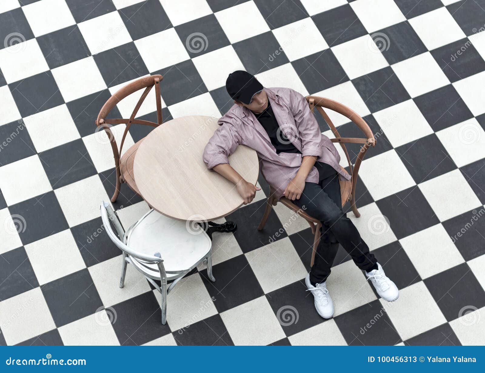 Young Man Sitting at Table, Top View Stock Image - Image of indoor ...