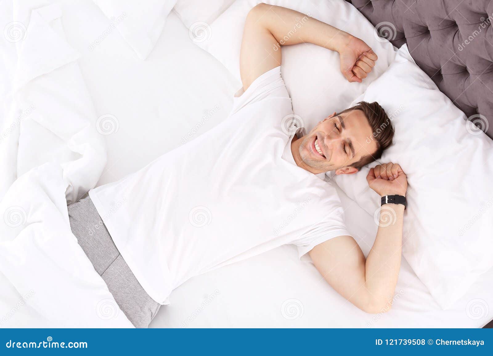 Young Man after Sleeping in Bed at Home Stock Photo - Image of rest ...