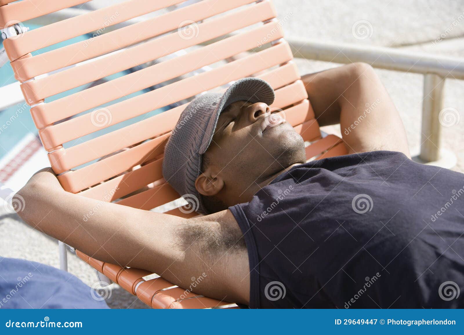 Young Man Sleeping on Deck Chair Stock Image - Image of american ...