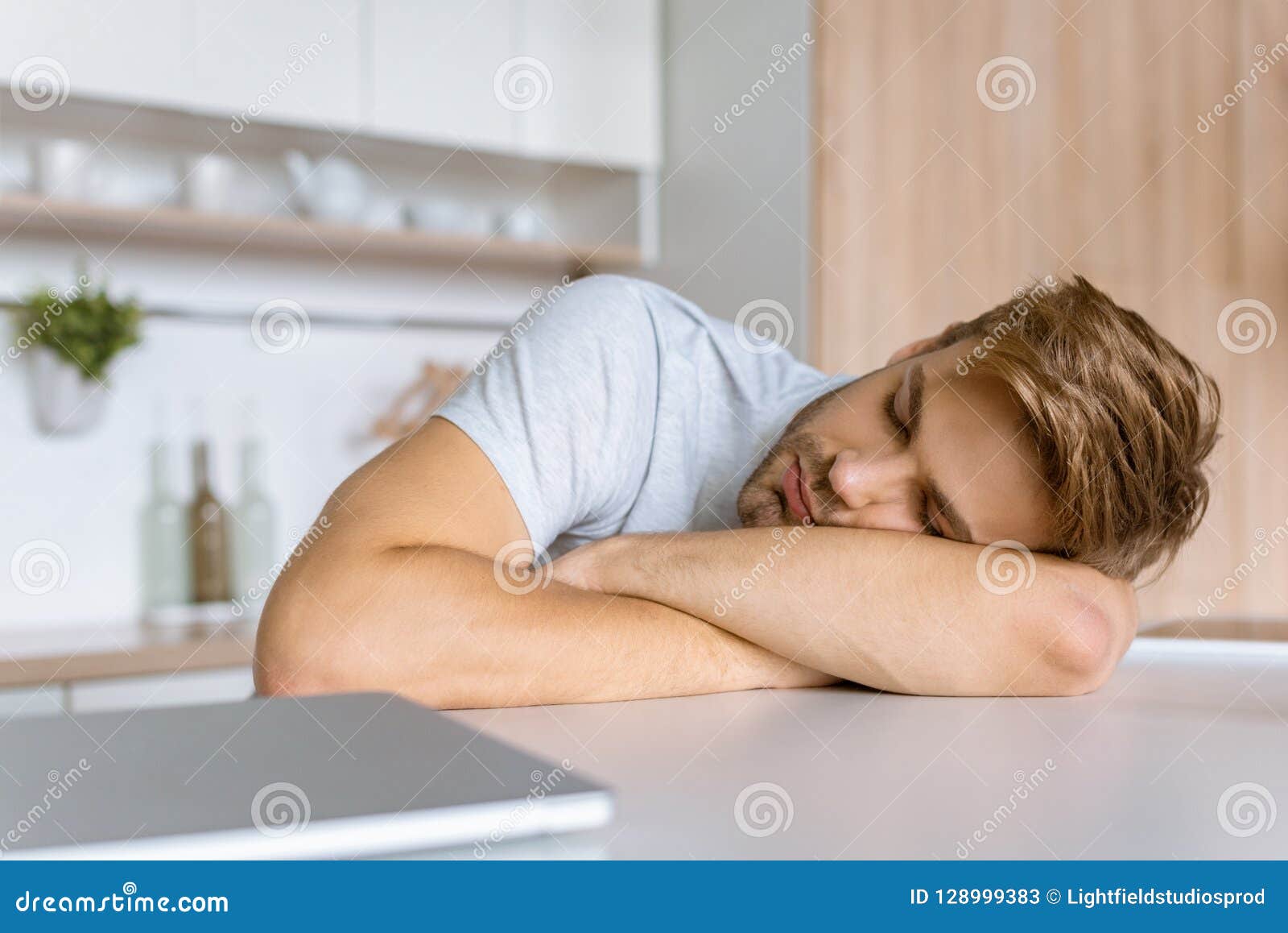 Young Man Sleeping at Kitchen Table Stock Image - Image of handsome ...