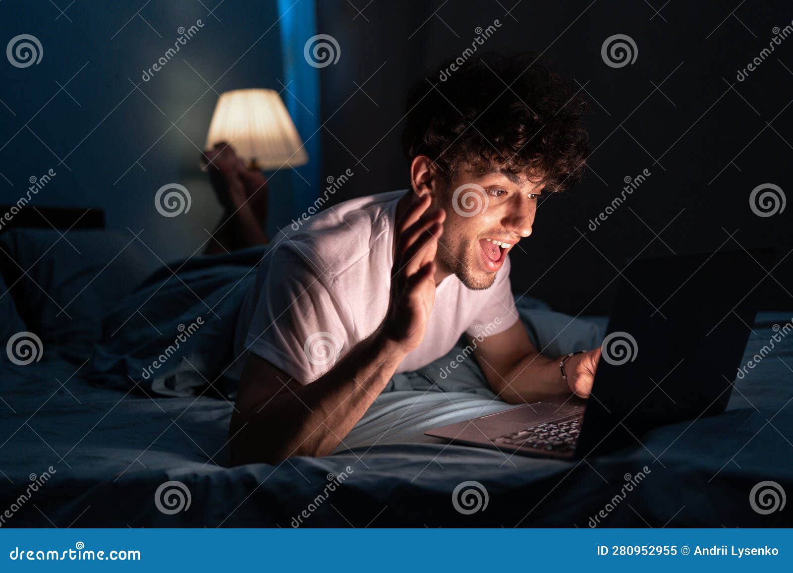 Young Man Sleeping and Using Laptop Computer for Social Network or ...