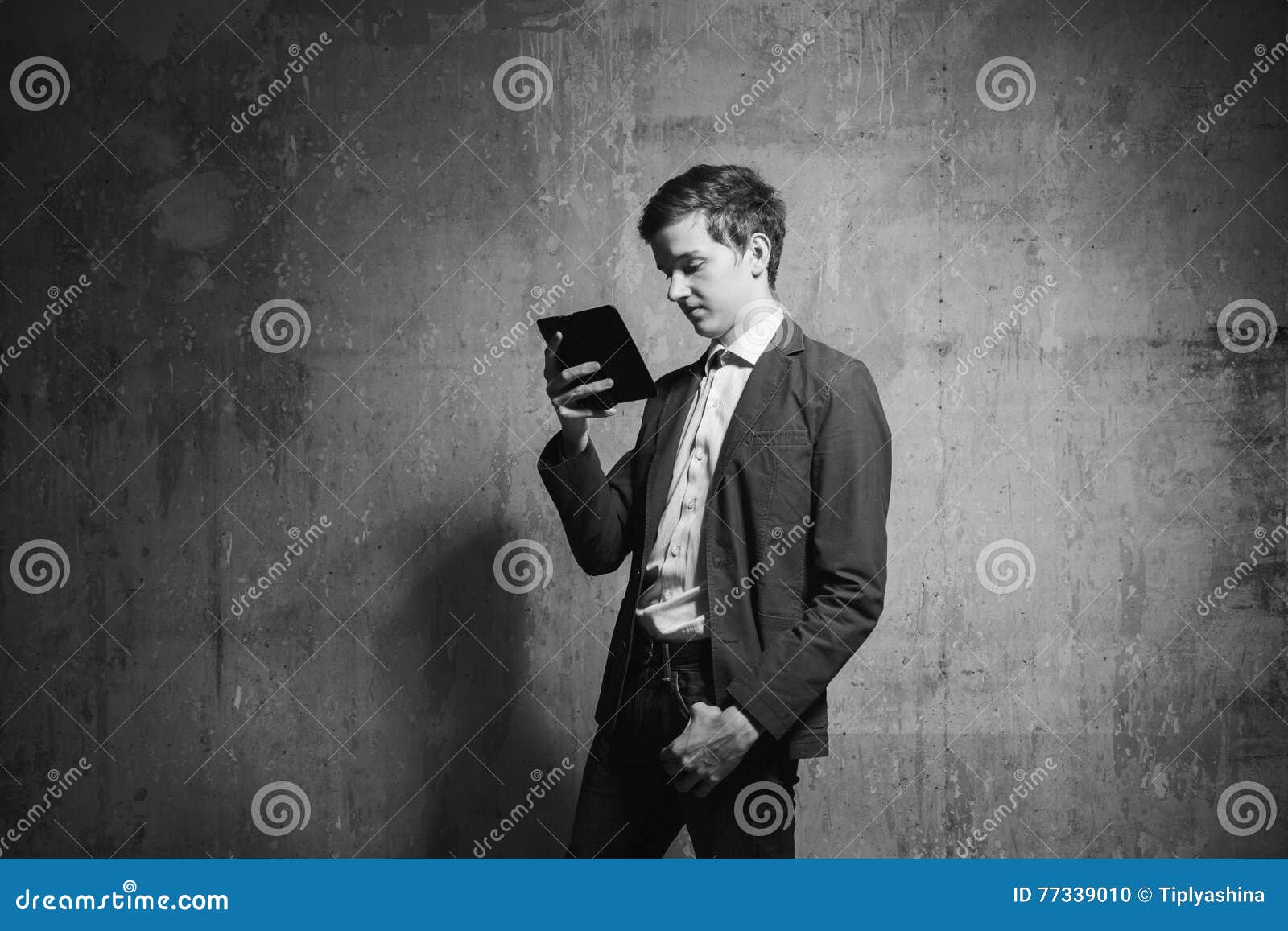 Young Man with a Smartphone Stock Photo - Image of mobile, young: 77339010