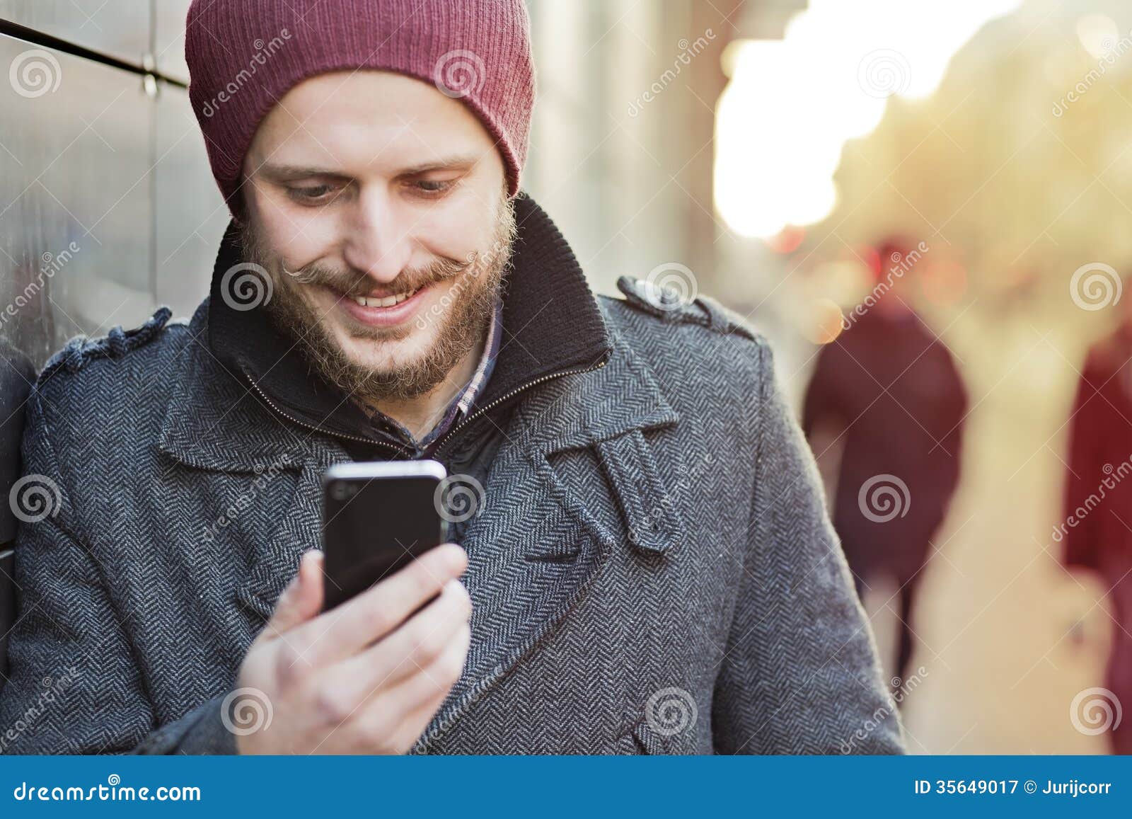 Young man with smartphone stock image. Image of equipment - 35649017