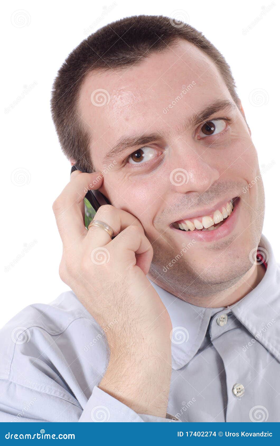 Young Man Smiling on the Phone Stock Photo - Image of alone ...
