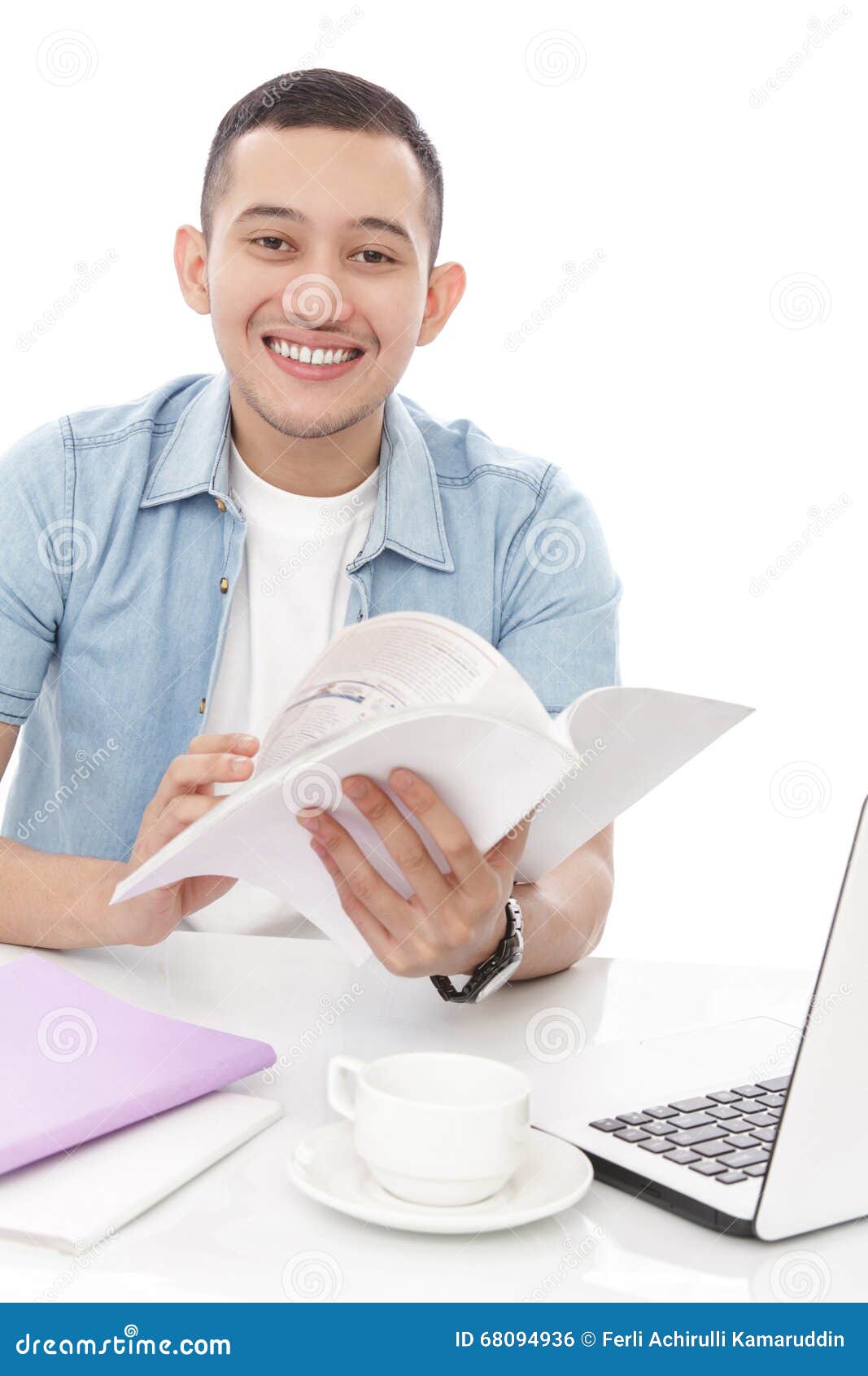 Young Man Smiling while Reading a Book Stock Photo - Image of friendly ...