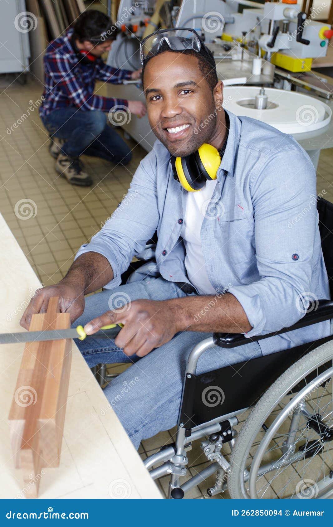 Young Man Smiling in Wheelchair Stock Photo - Image of work, smiling ...