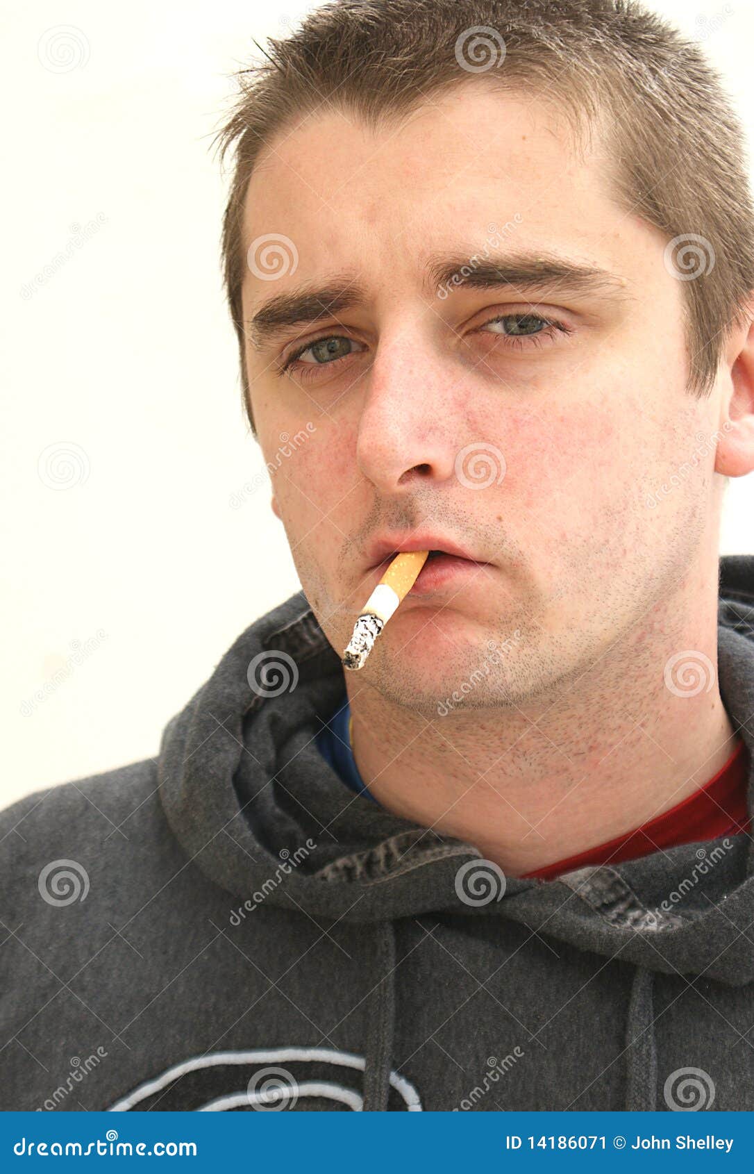Young Man Smoking stock image. Image of stress, heart - 14186071