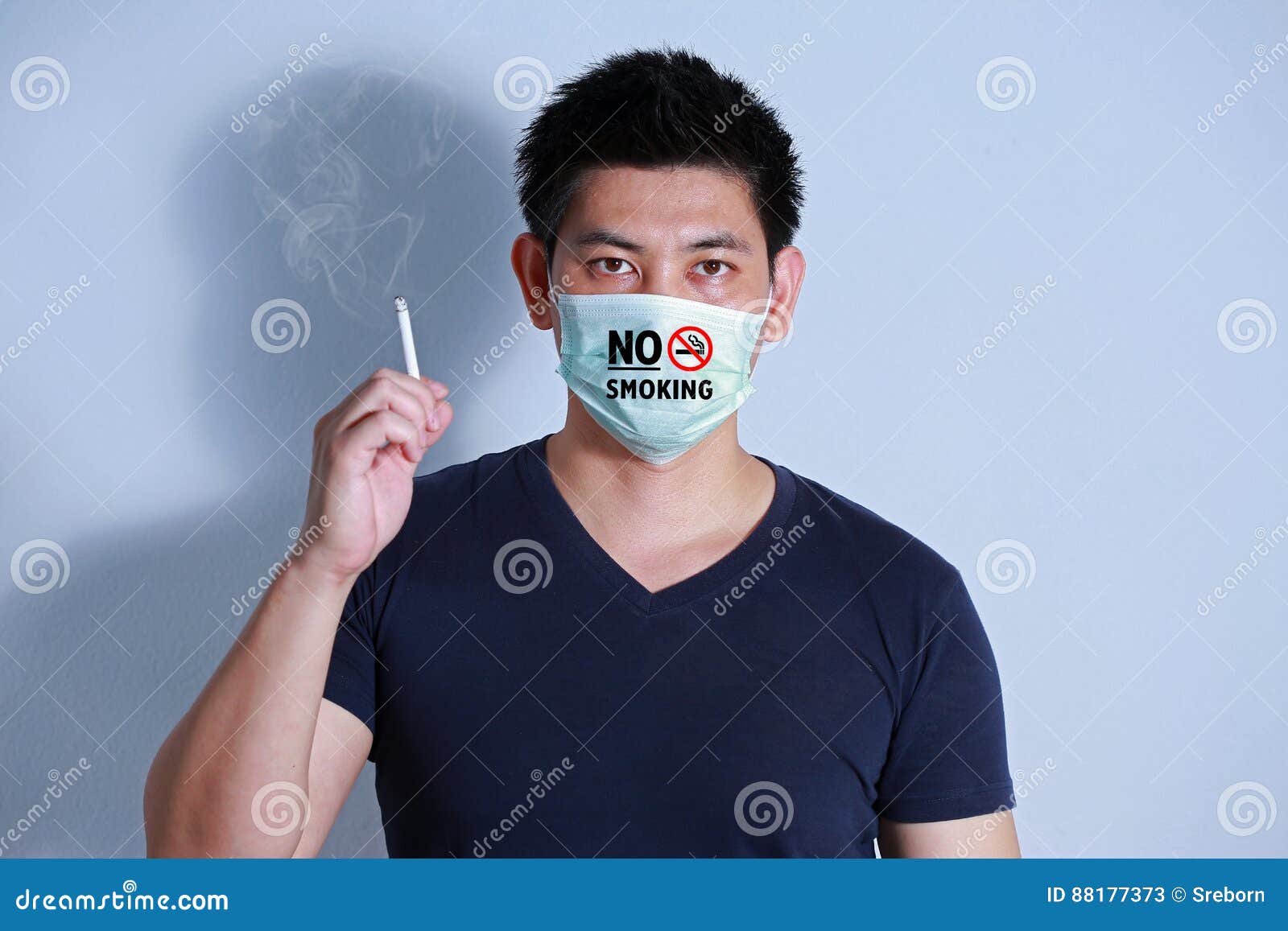Young Man Smoking Cigarette with Protective Mask Stock Image - Image of ...