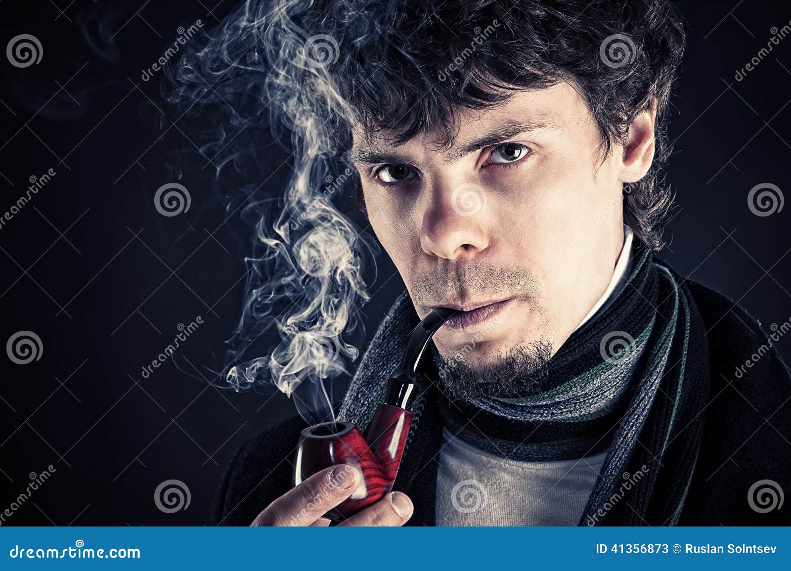 Young man smoking a pipe stock image. Image of closeup - 41356873