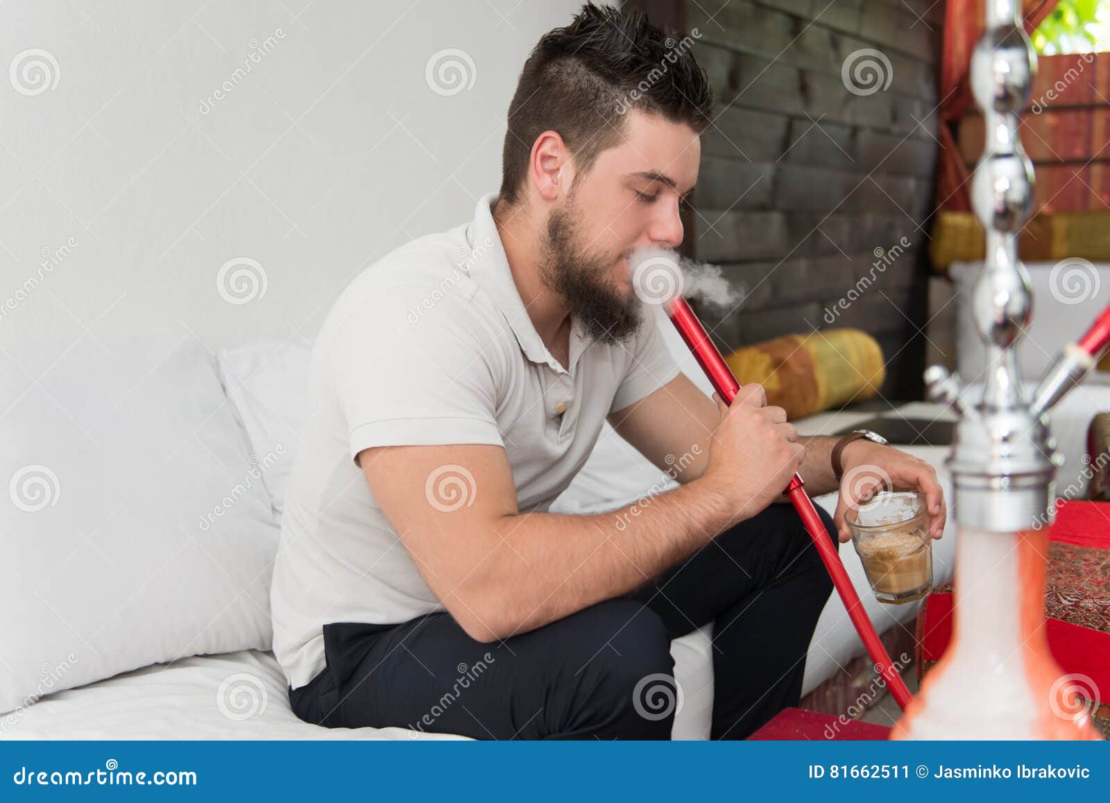 Young Man Smoking Shisha At Arabic Restaurant Stock Image Image Of