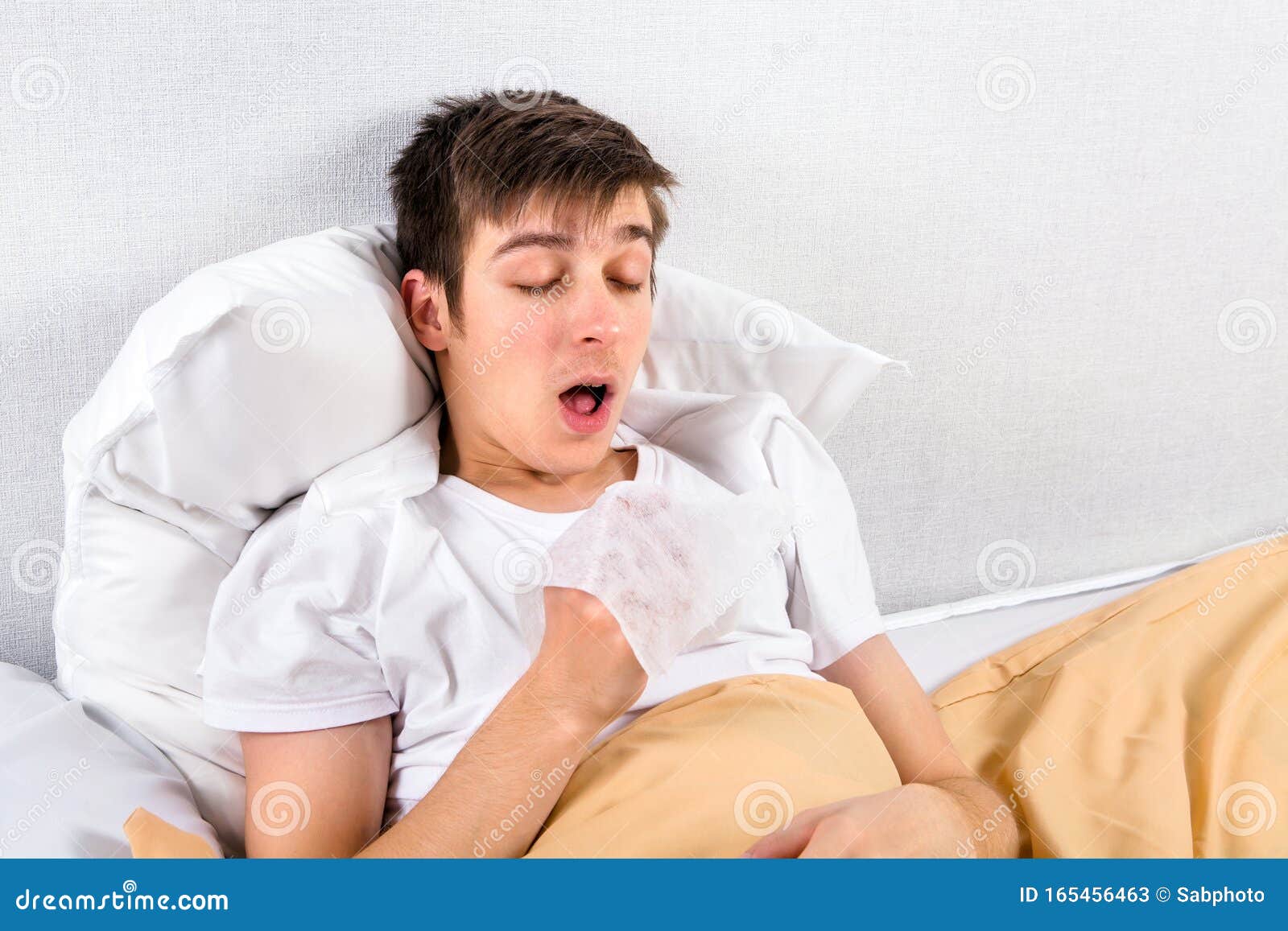 Young Man is Sneezing stock image. Image of sickness - 165456463