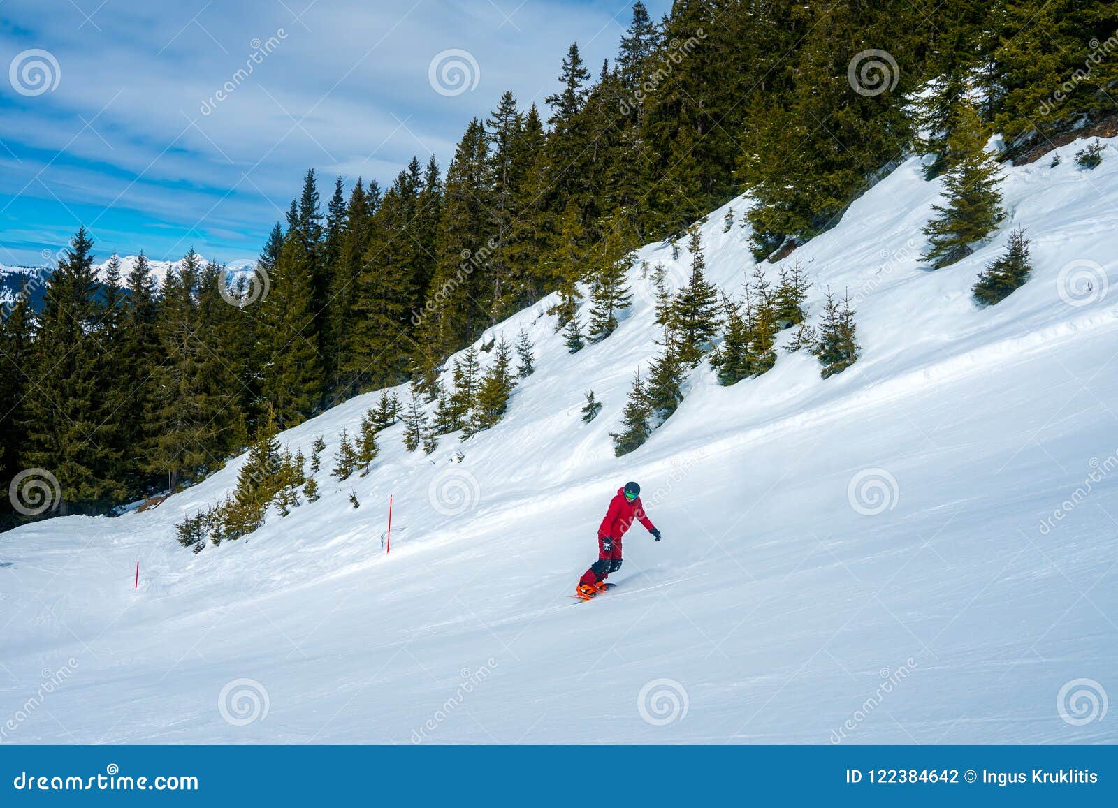 Young Man Snowboarding in the Austrian Alps, Making Different Tricks ...