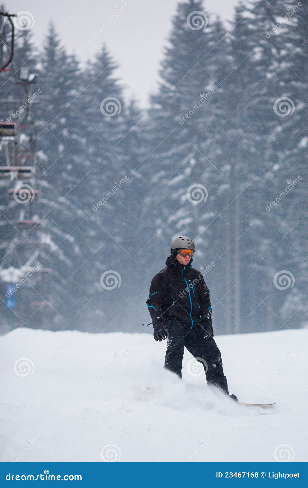 Young Man Snowboarding Down a Slope Stock Photo - Image of enjoy ...