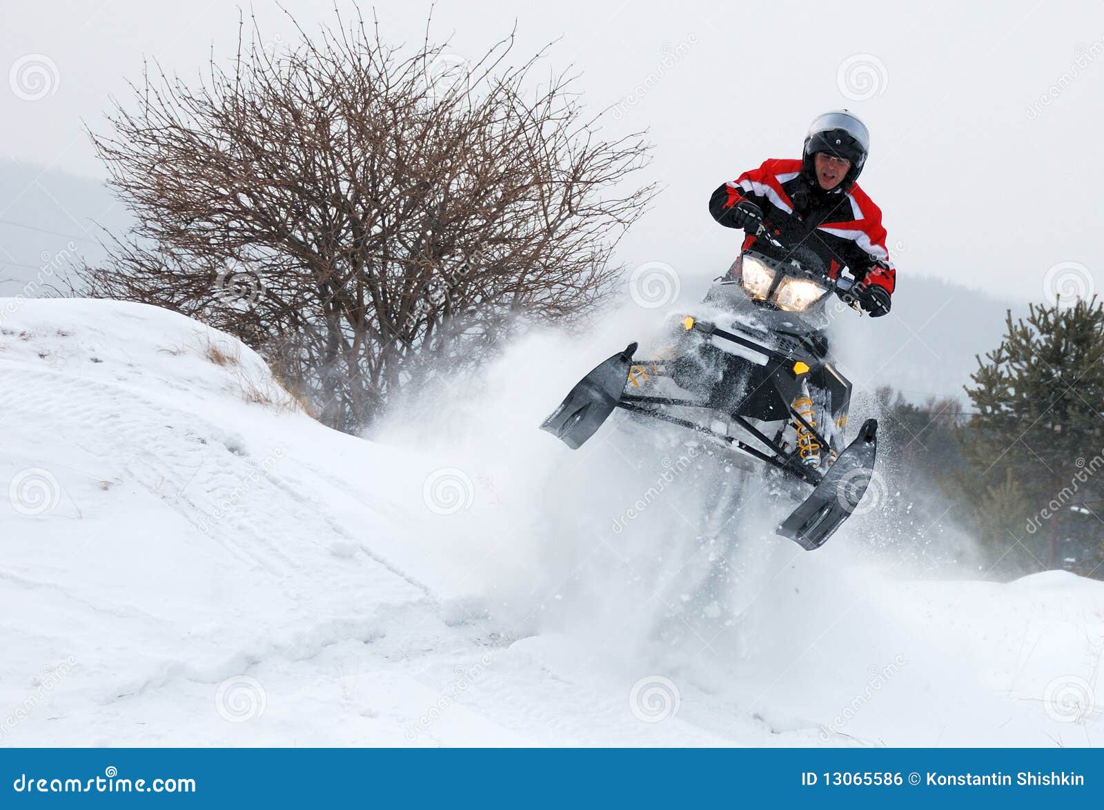 Young Man on Snowmobile Jumping Stock Photo - Image of season, activity ...