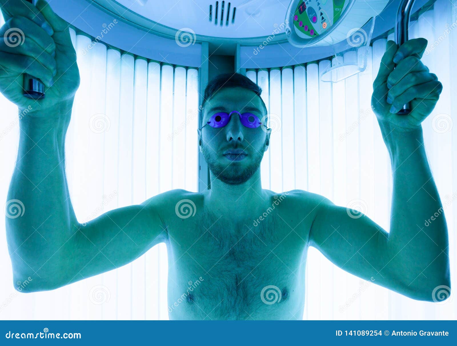 Young Man at Solarium in Beauty Salon Stock Photo - Image of build ...