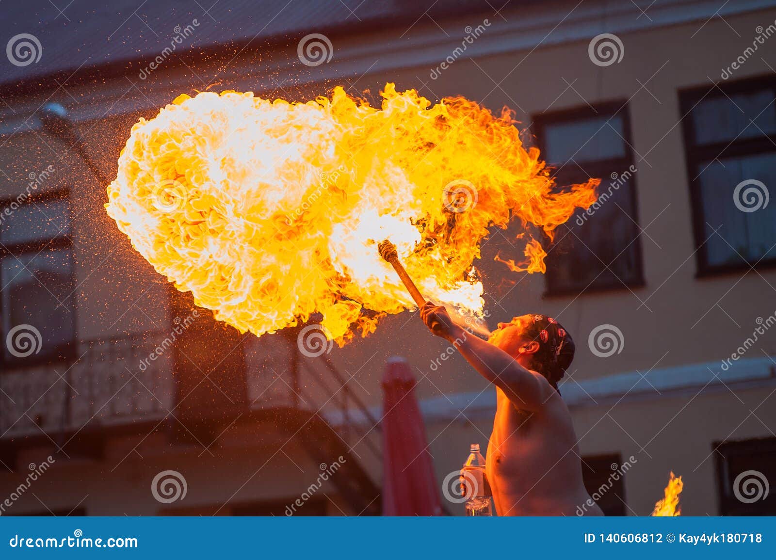 A Young Man Spews a Fire Out of His Mouth Editorial Photography - Image ...