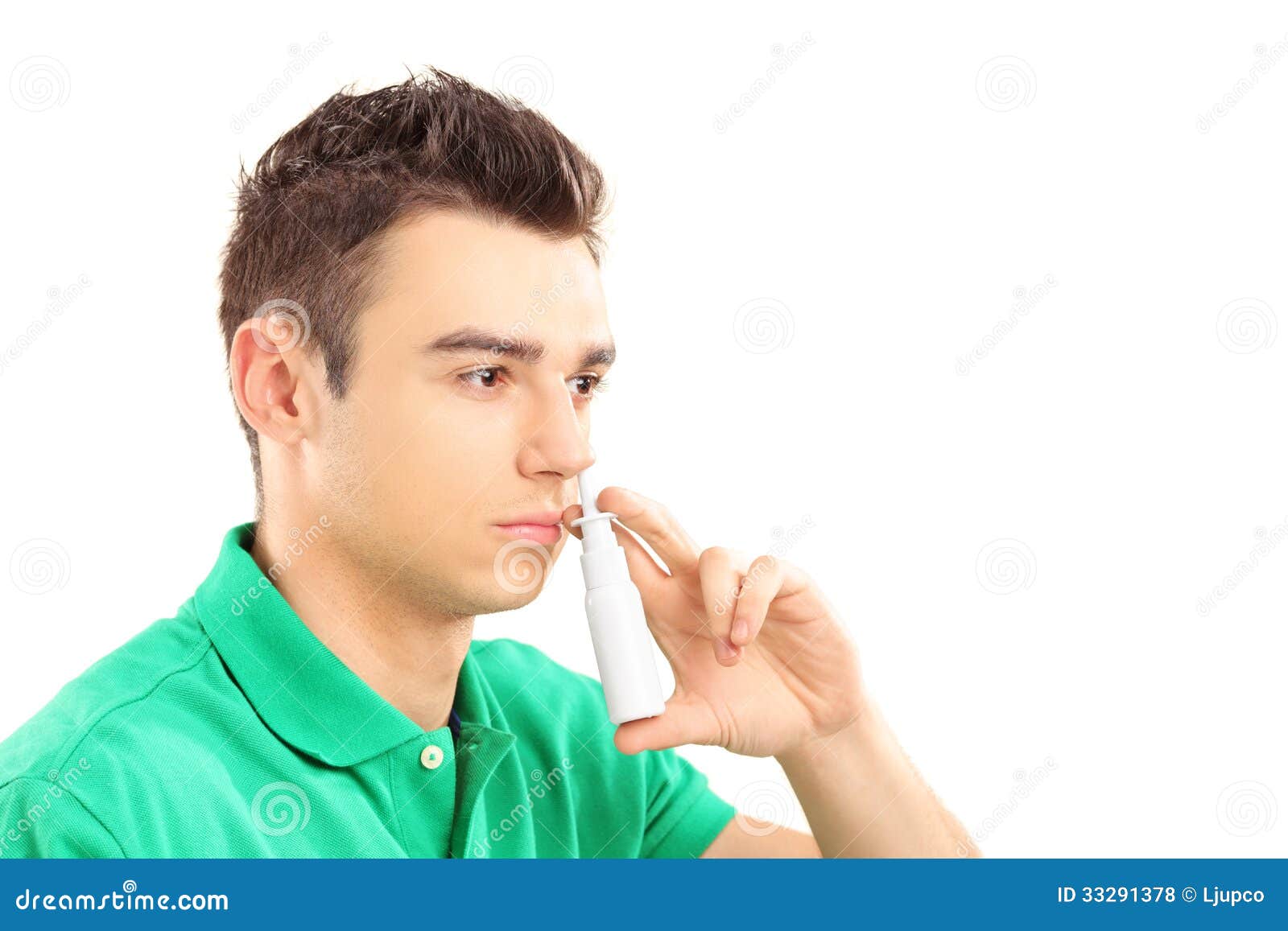 Young Man Spraying Nose Drops Stock Photo - Image of cure, hold: 33291378
