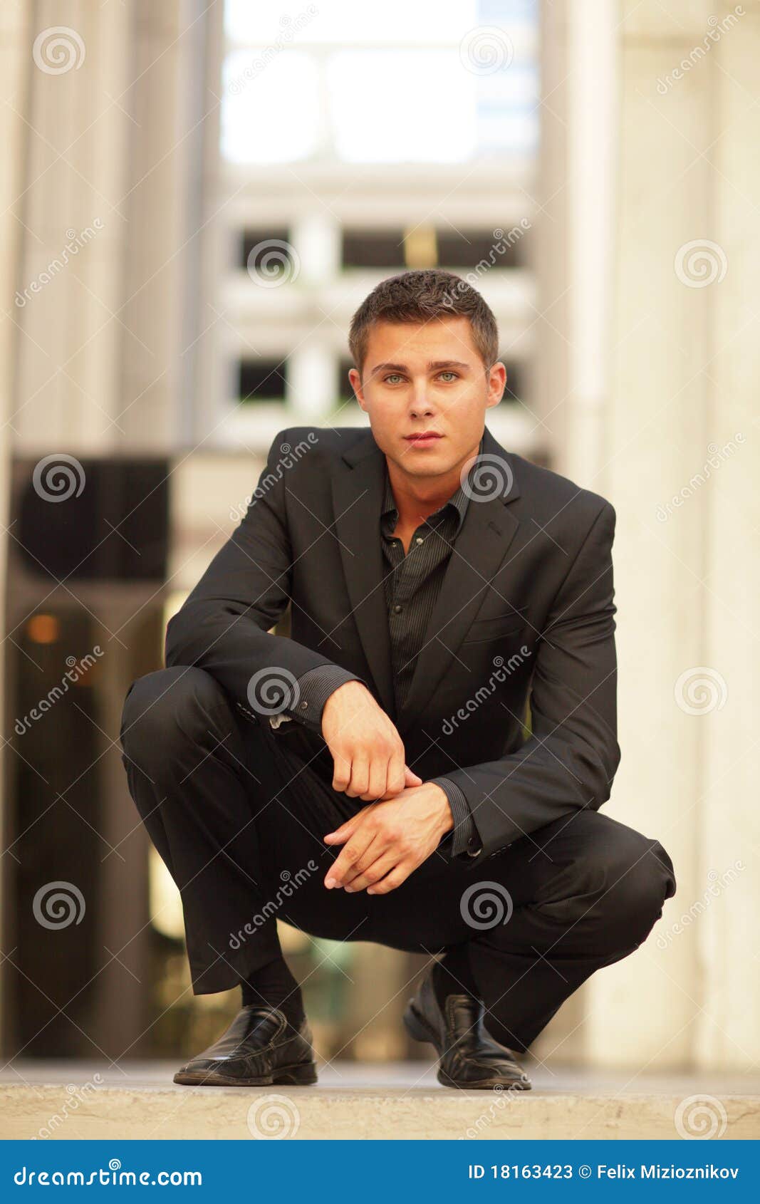 Young man squatting stock image. Image of wellness, caucasian - 18163423