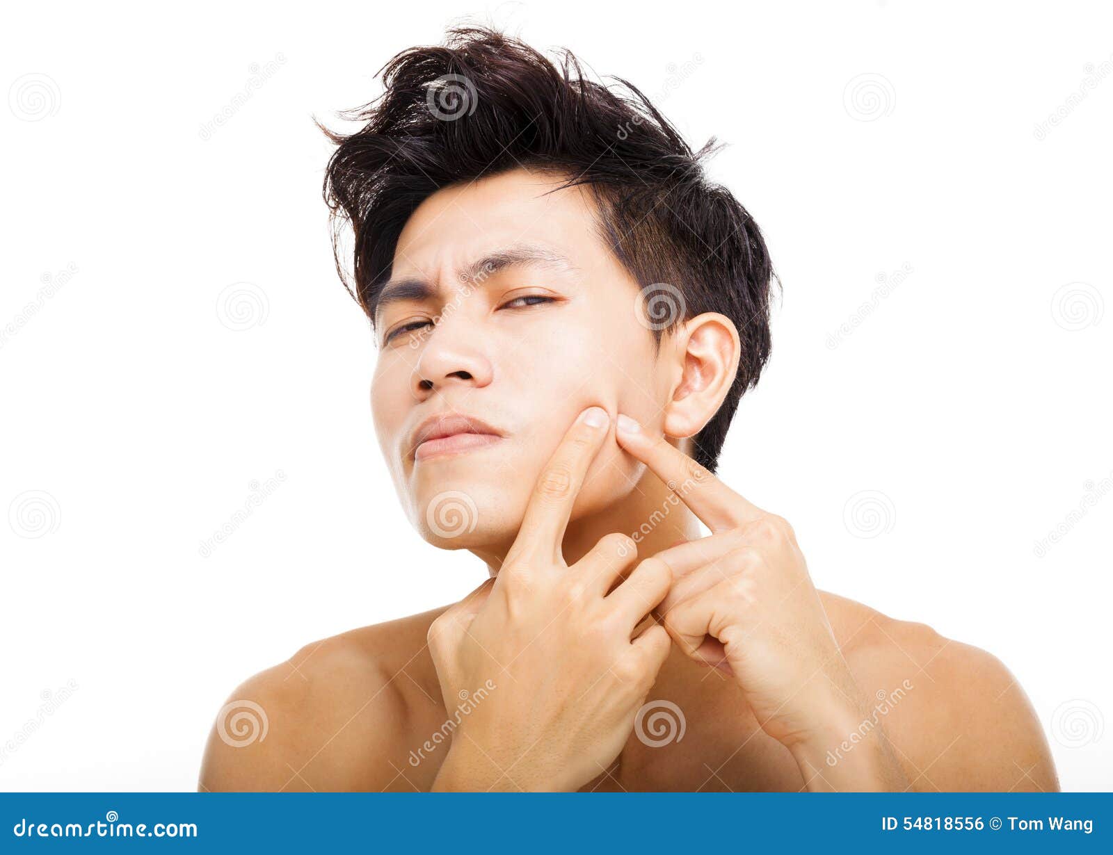 Young man Squeezing pimple stock photo. Image of squeezing - 54818556