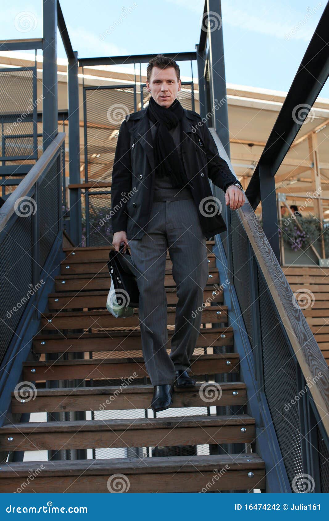 Young man on staircase stock photo. Image of food, wooden - 16474242