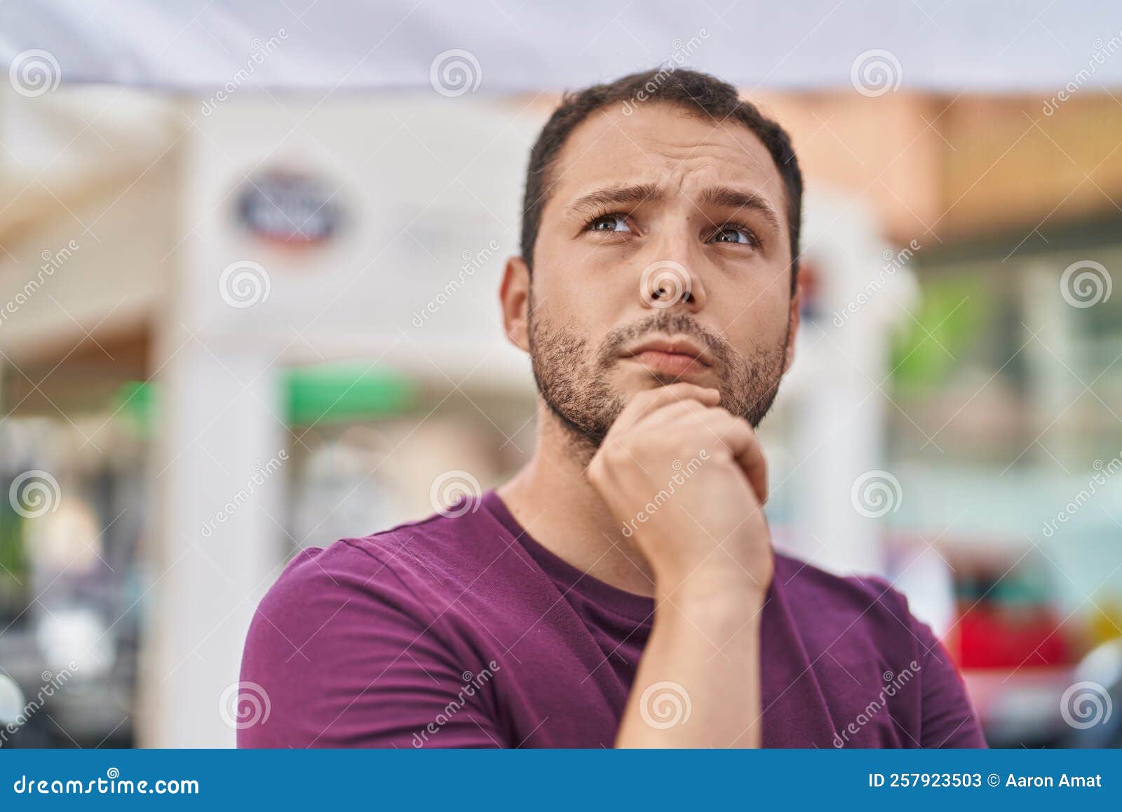 Young Man Standing with Doubt Expression at Street Stock Image - Image ...