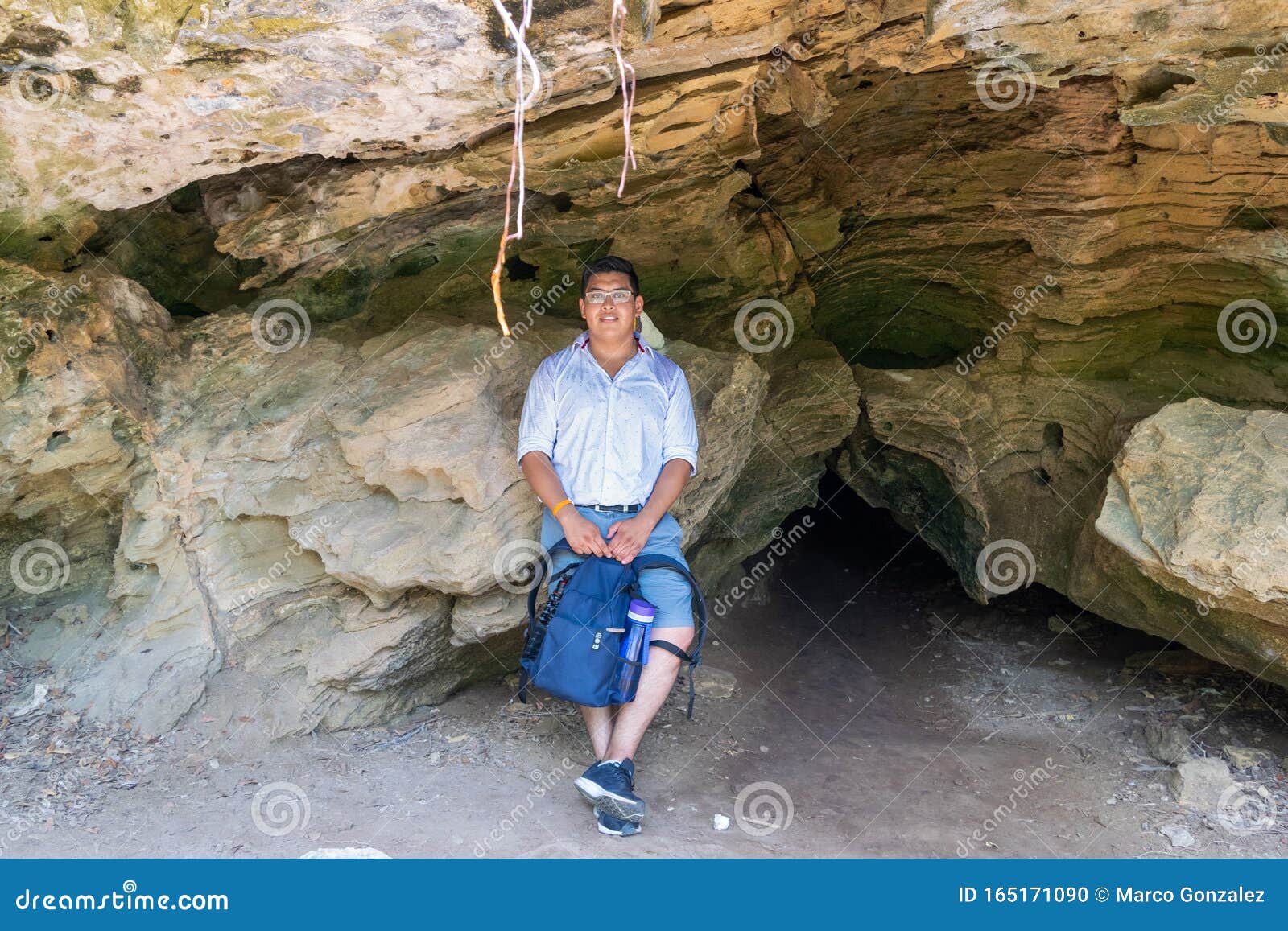 Young Man Standing Inside of a Cave Stock Photo - Image of island ...