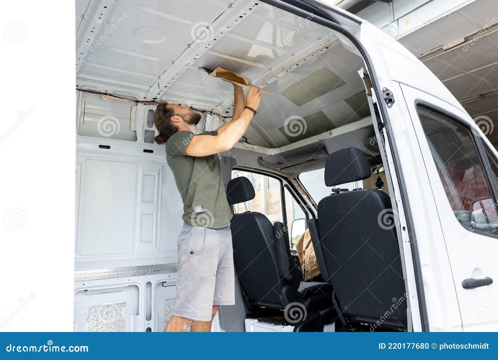 Man Attaching Noise Insulation Inside a Van Stock Photo - Image of ...