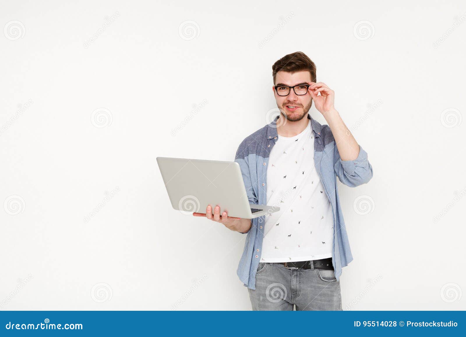 Young Man Standing with Laptop Stock Photo - Image of camera ...