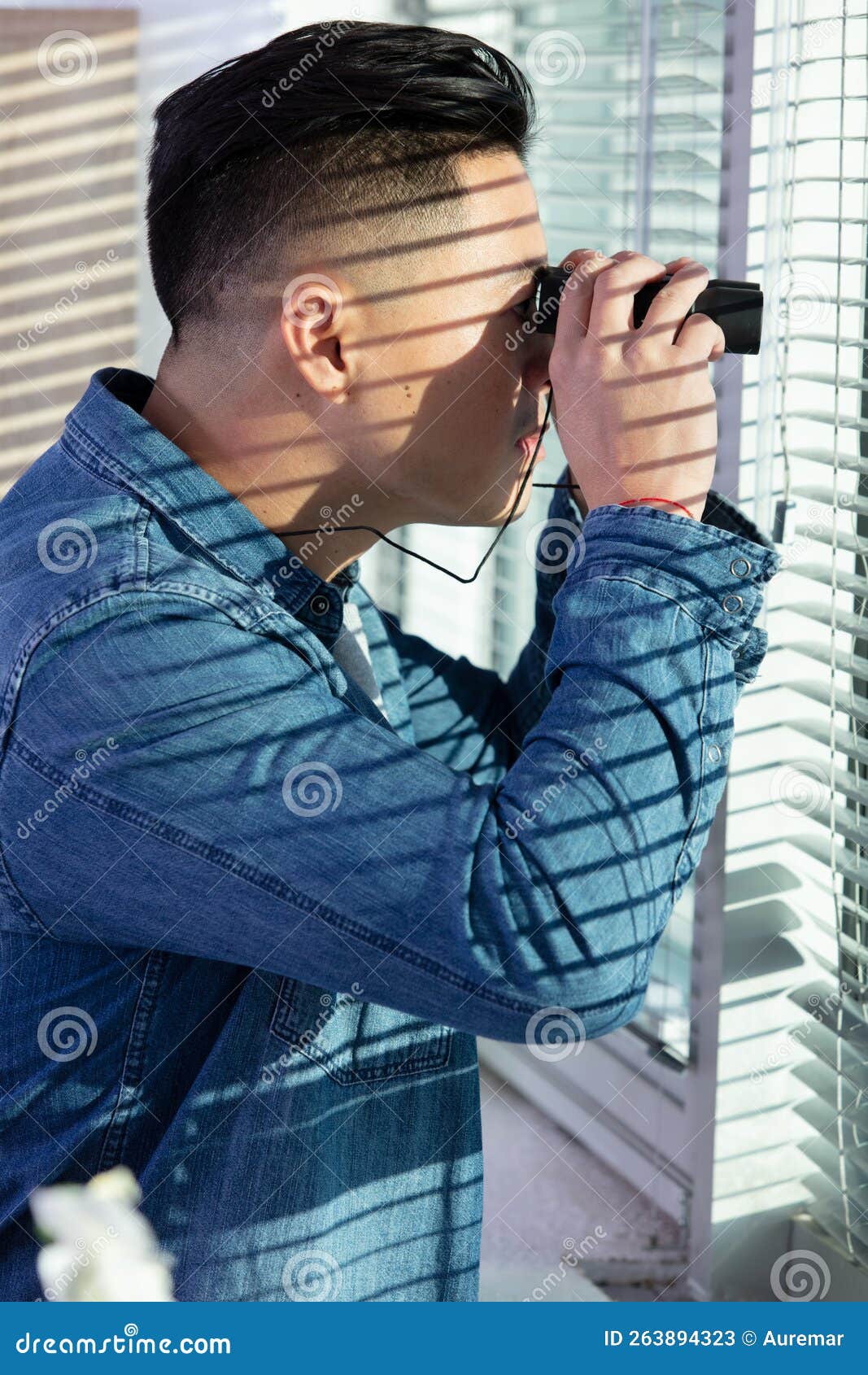 Young Man Standing Looking through Glass Window with Binoculars Stock Image - Image of home ...