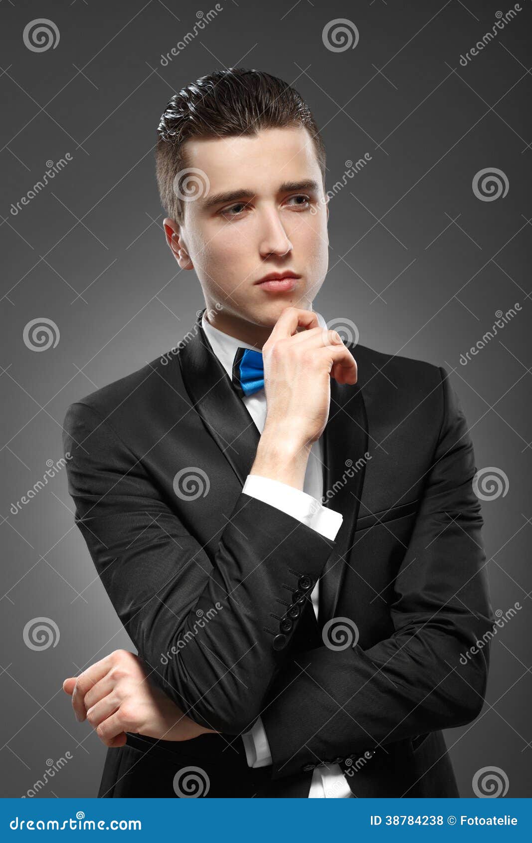Young Man is Standing Lost in Thought Stock Photo - Image of friendly ...