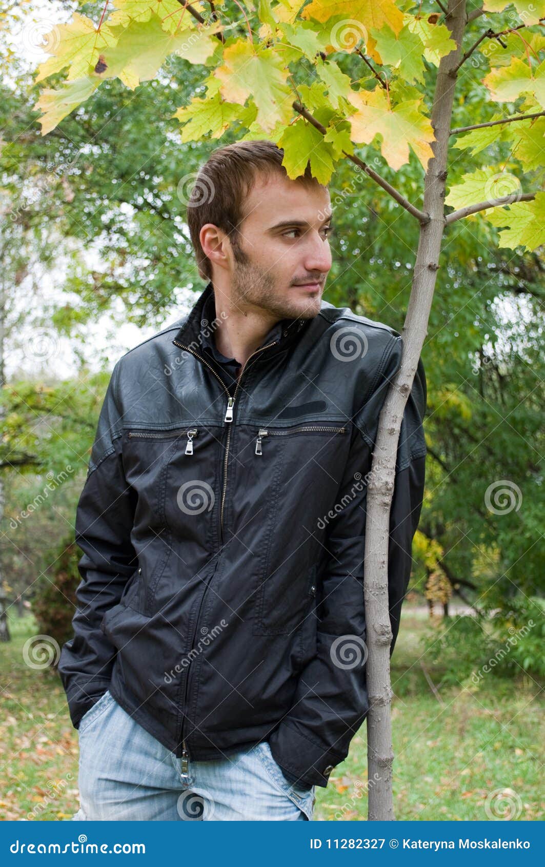 Young Man Standing Near the Autumn Tree Stock Image - Image of jaket ...