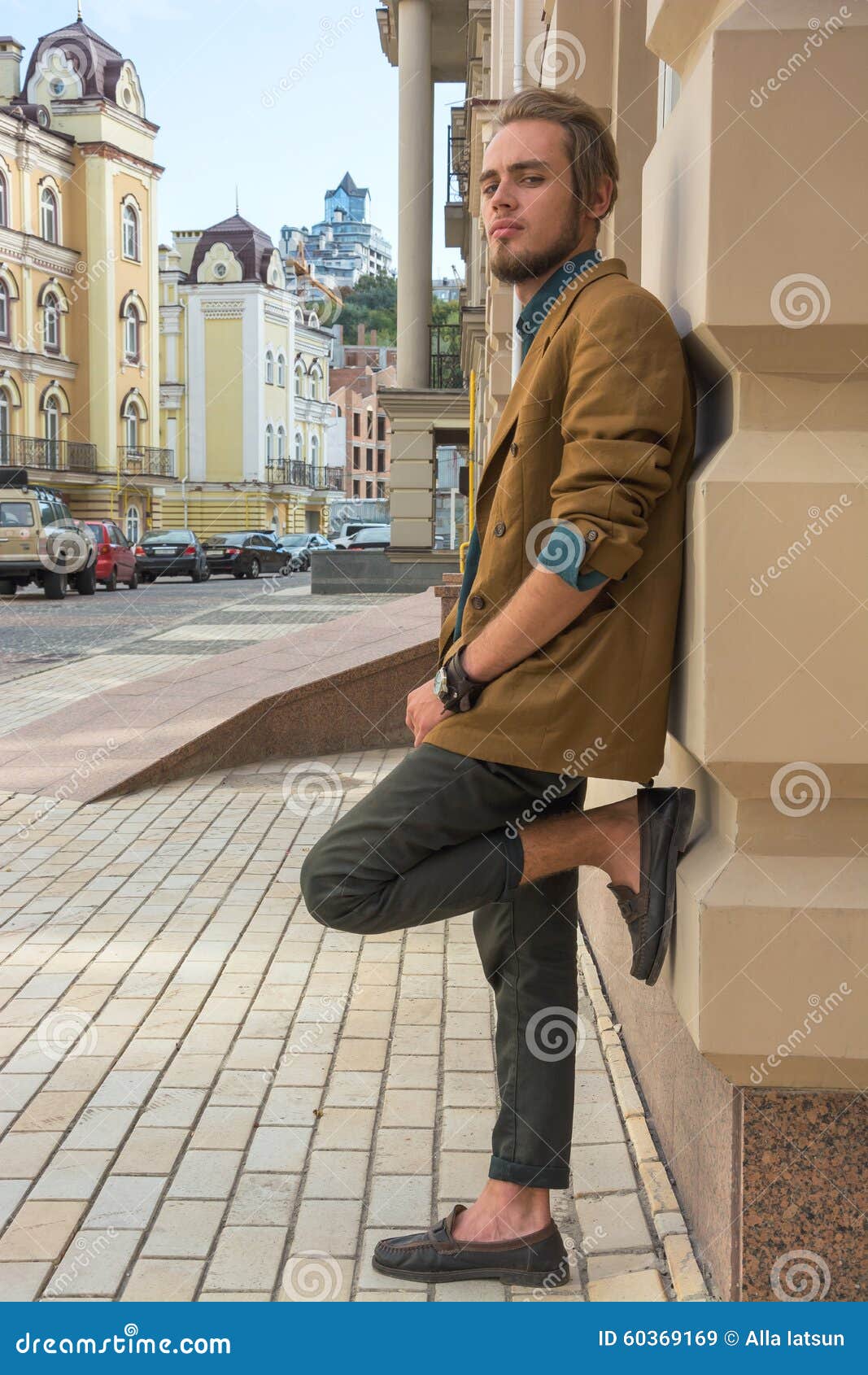 A Young Man is Standing Near a Wall Stock Image - Image of freshness ...