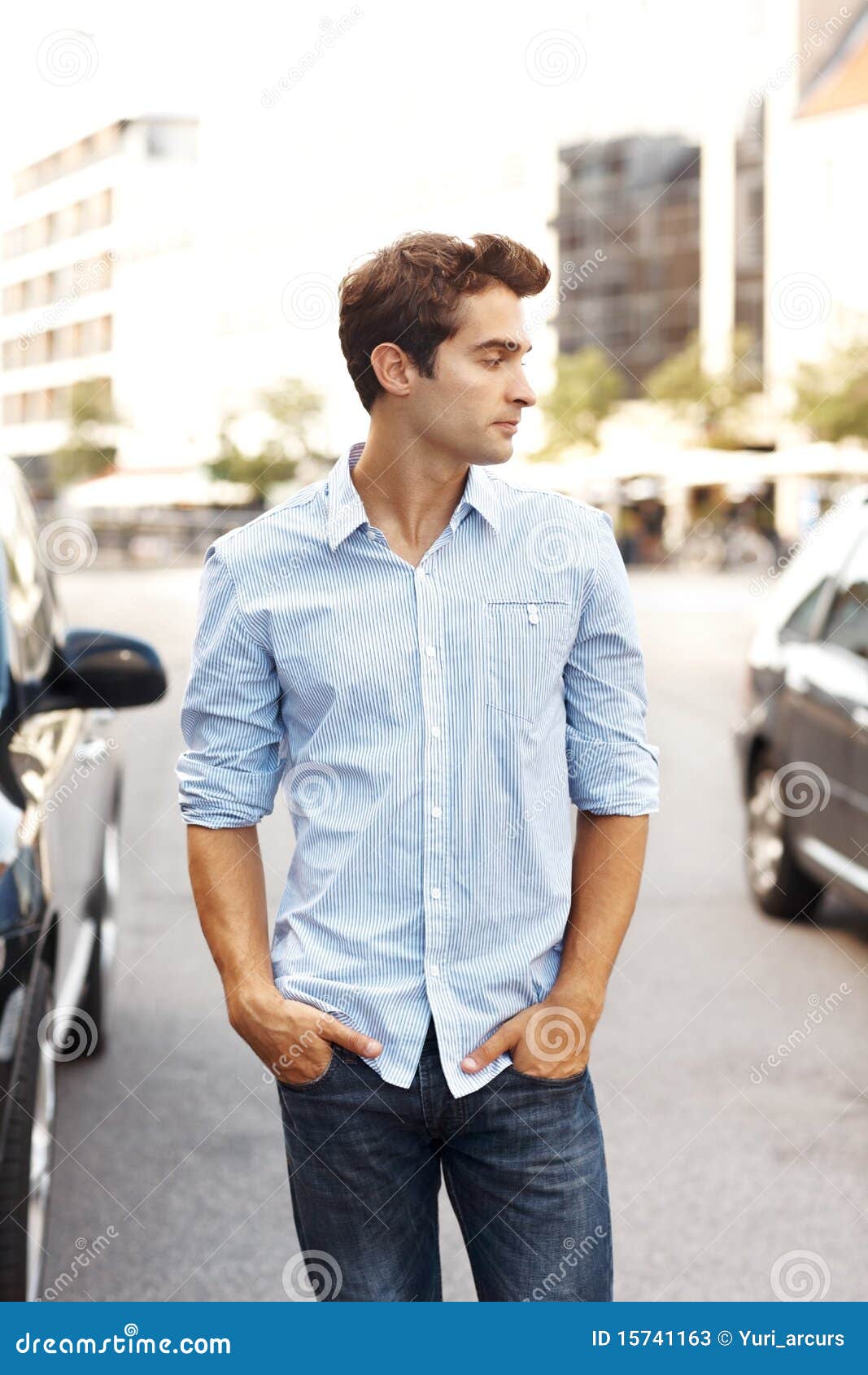 Young Man Standing Outdoor Looking Away Stock Image - Image of carefree ...