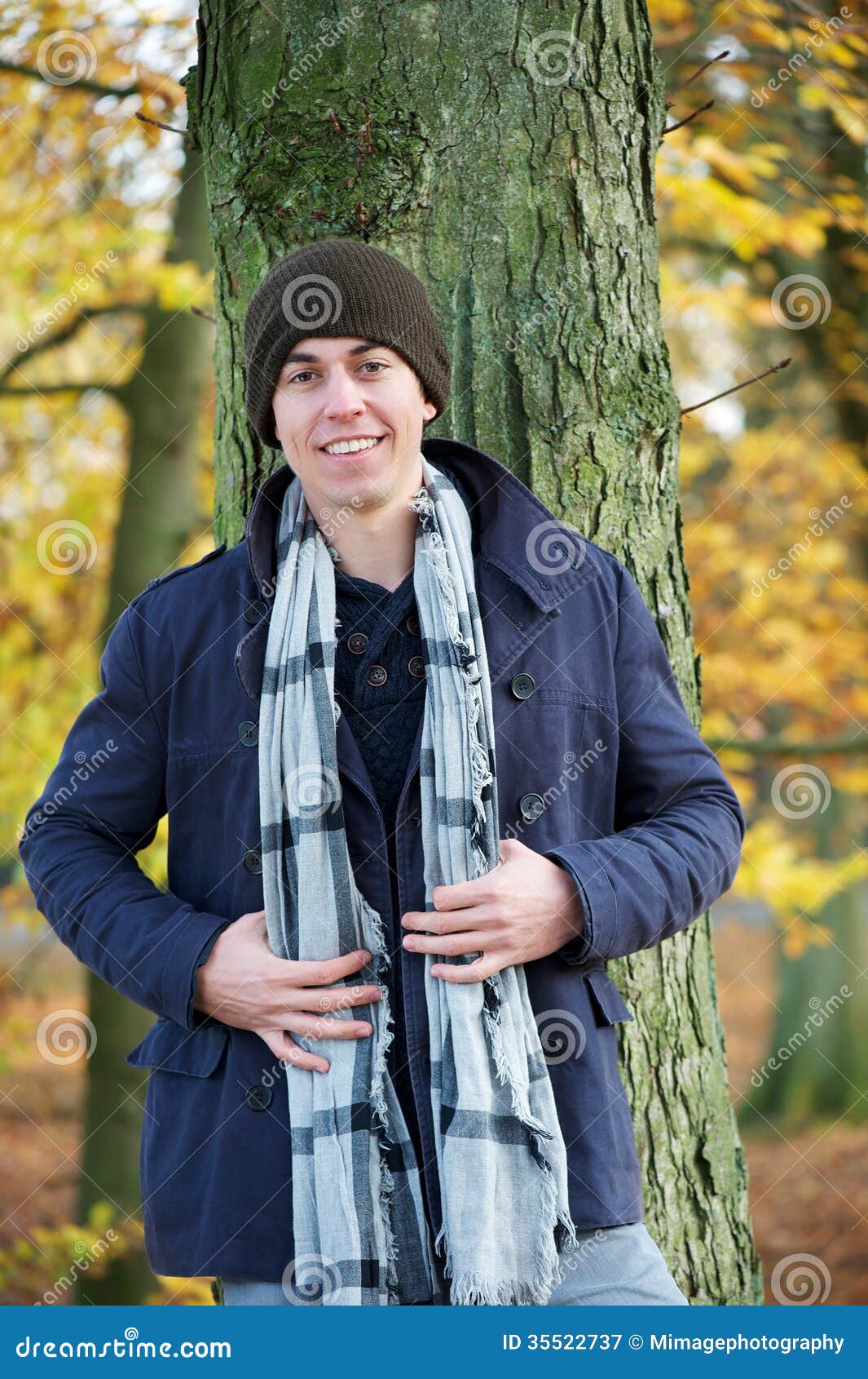 Young Man Standing Outdoors on a Fall Day Stock Image - Image of nature ...