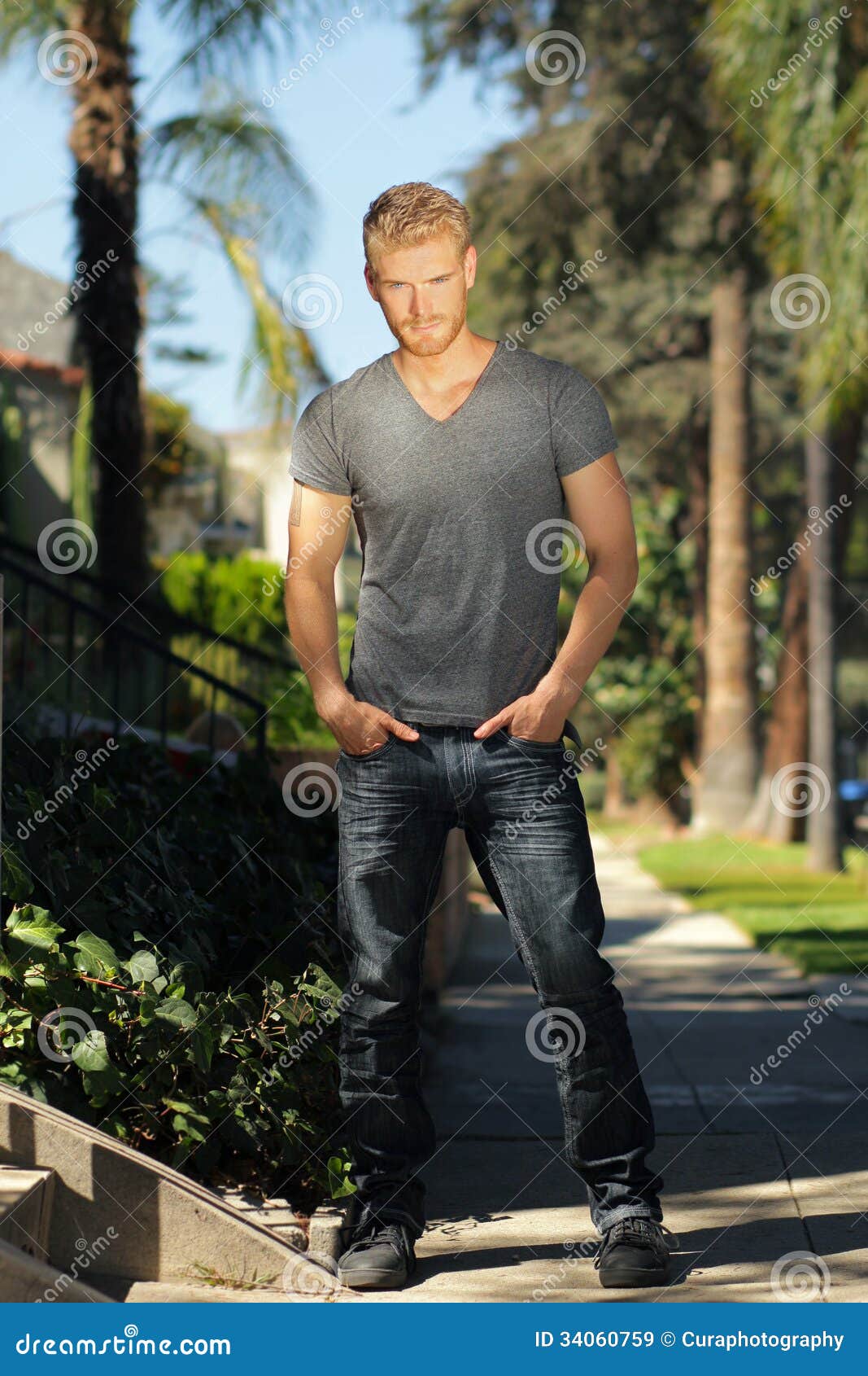 Young man standing outside stock image. Image of twenties - 34060759