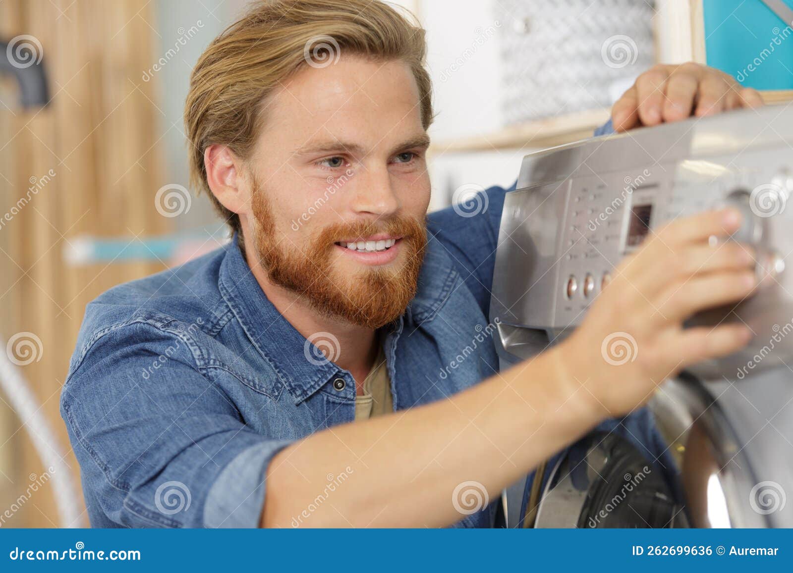 Young Man Starting Washing Machine Stock Photo - Image of chores ...
