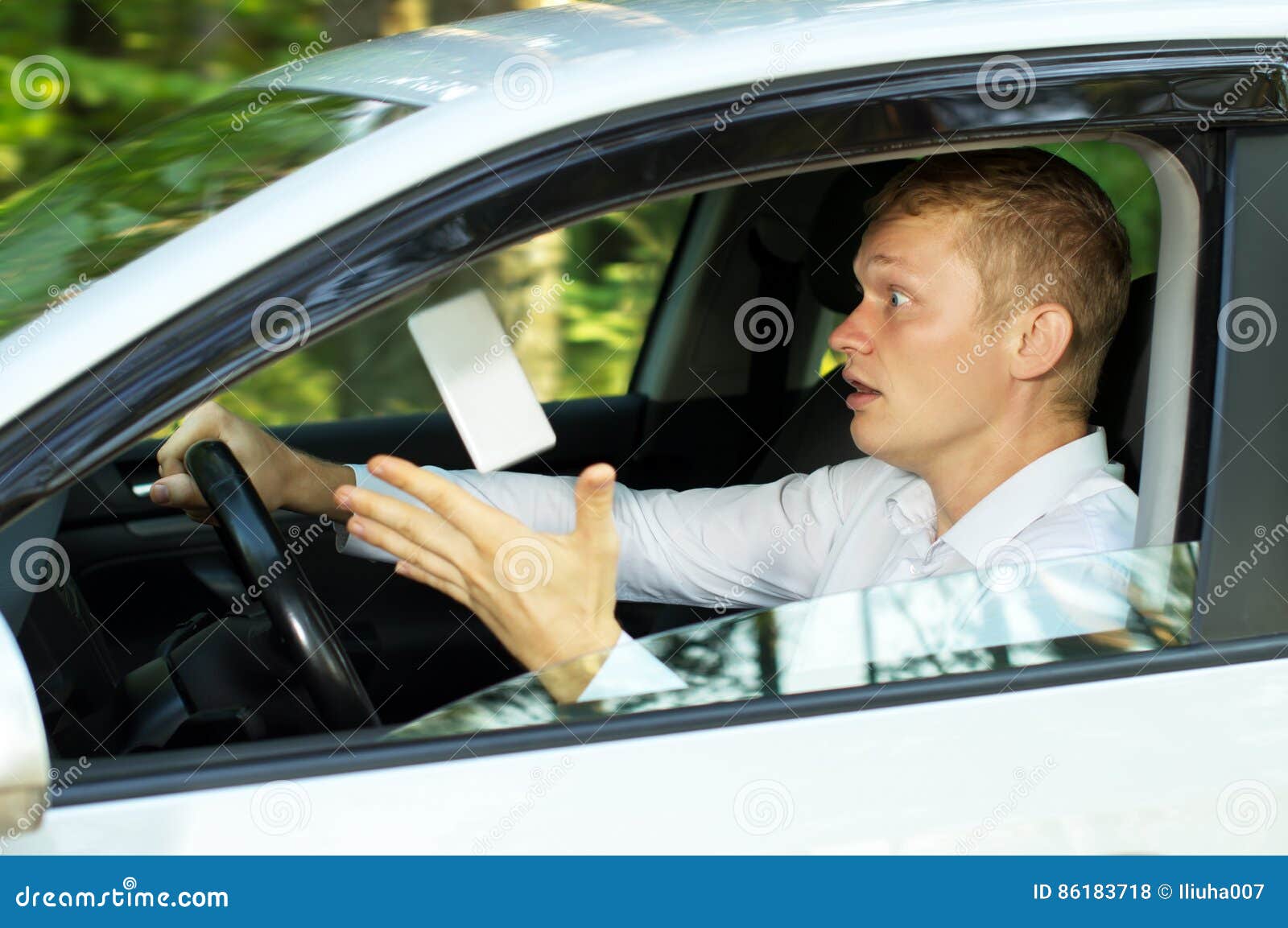 The Young Man Startled Shouts Stock Photo - Image of paying, driving ...