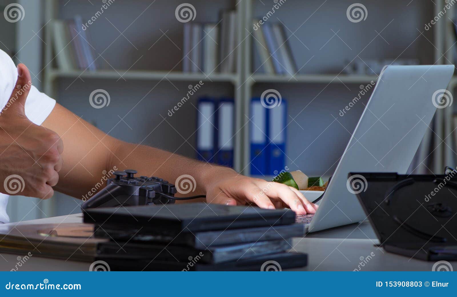Young Man Staying Late in Office To Do Overtime Work Stock Image ...