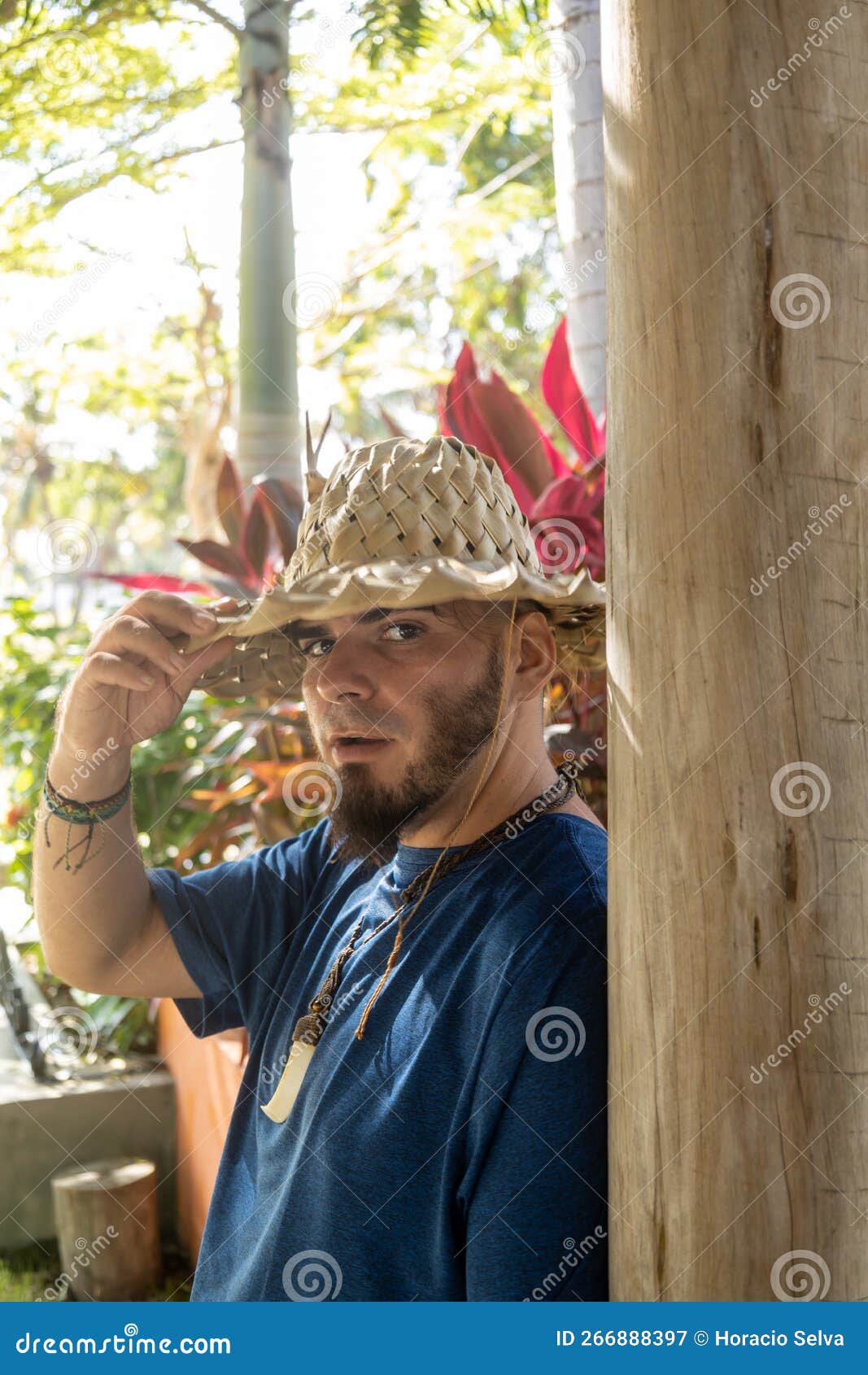 Young Man with Straw Hat and Surprised Expression Stock Image - Image ...