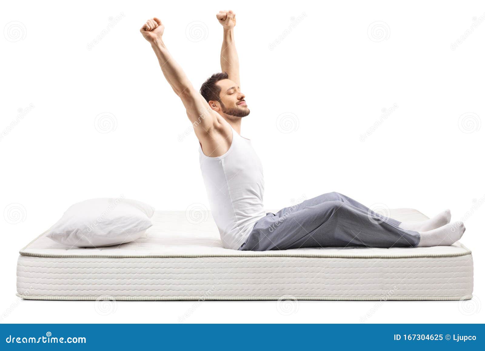 Young Man Stretching on a Bed Mattress 库存图片 - 图片 包括有 成人, 白种人: 167304625