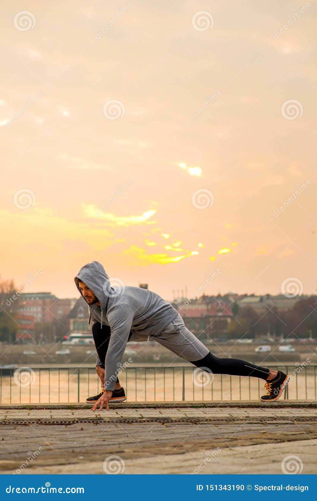 Young man stretching stock photo. Image of activity - 151343190