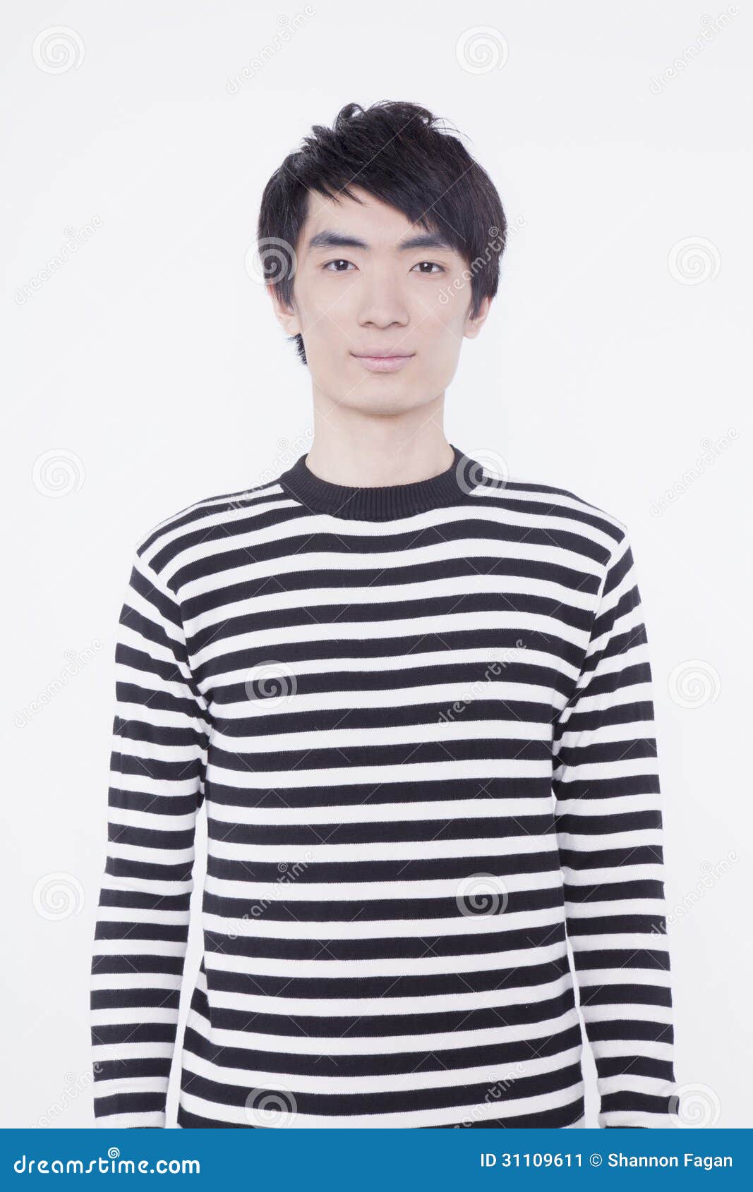 Young Man in Striped Shirt Looking at Camera, Studio Shot Stock Image ...