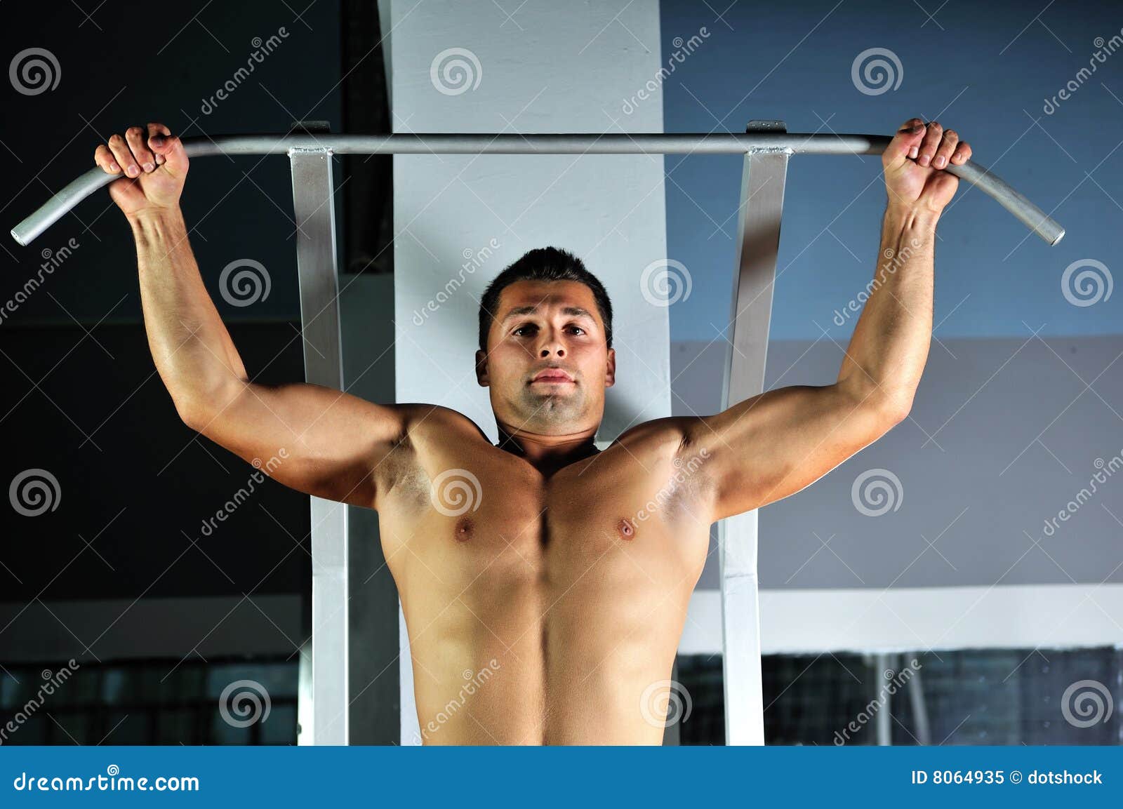 Young Man with Strong Arms Working Out in Gym Stock Image - Image of ...